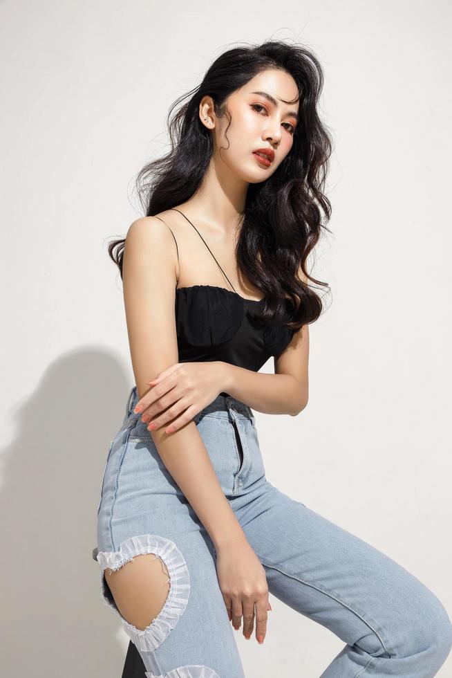 Street Fashion Slender Figure Beautiful Face Graceful Woman Sitting