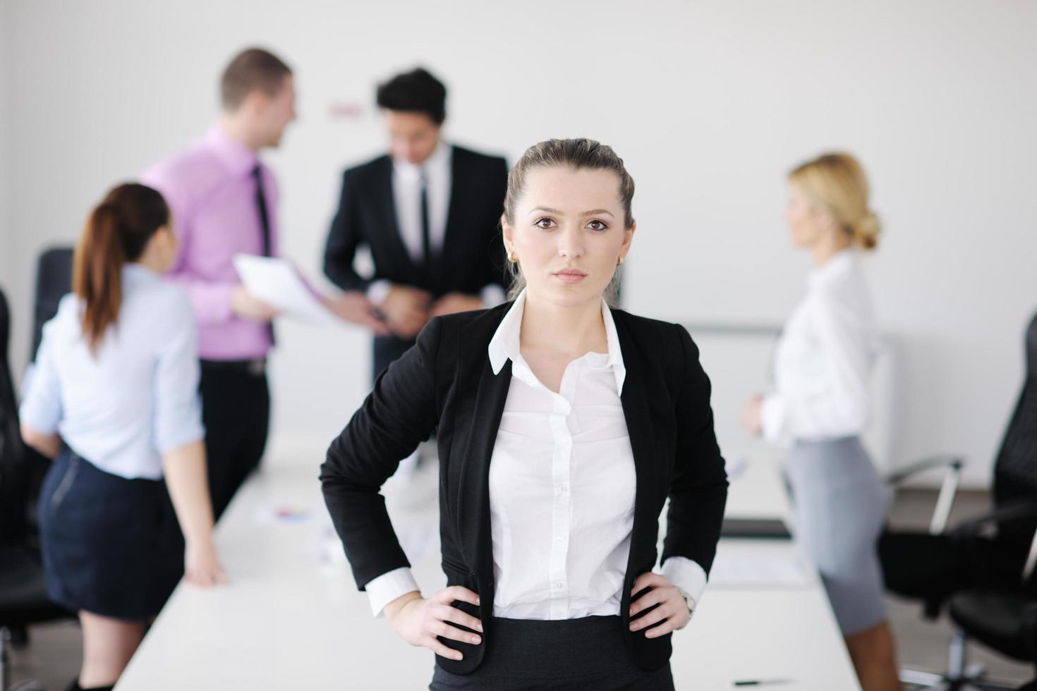 business woman standing with her staff in background 12081775 Stock ... business woman standing with her staff in background 12081775 Stock ...