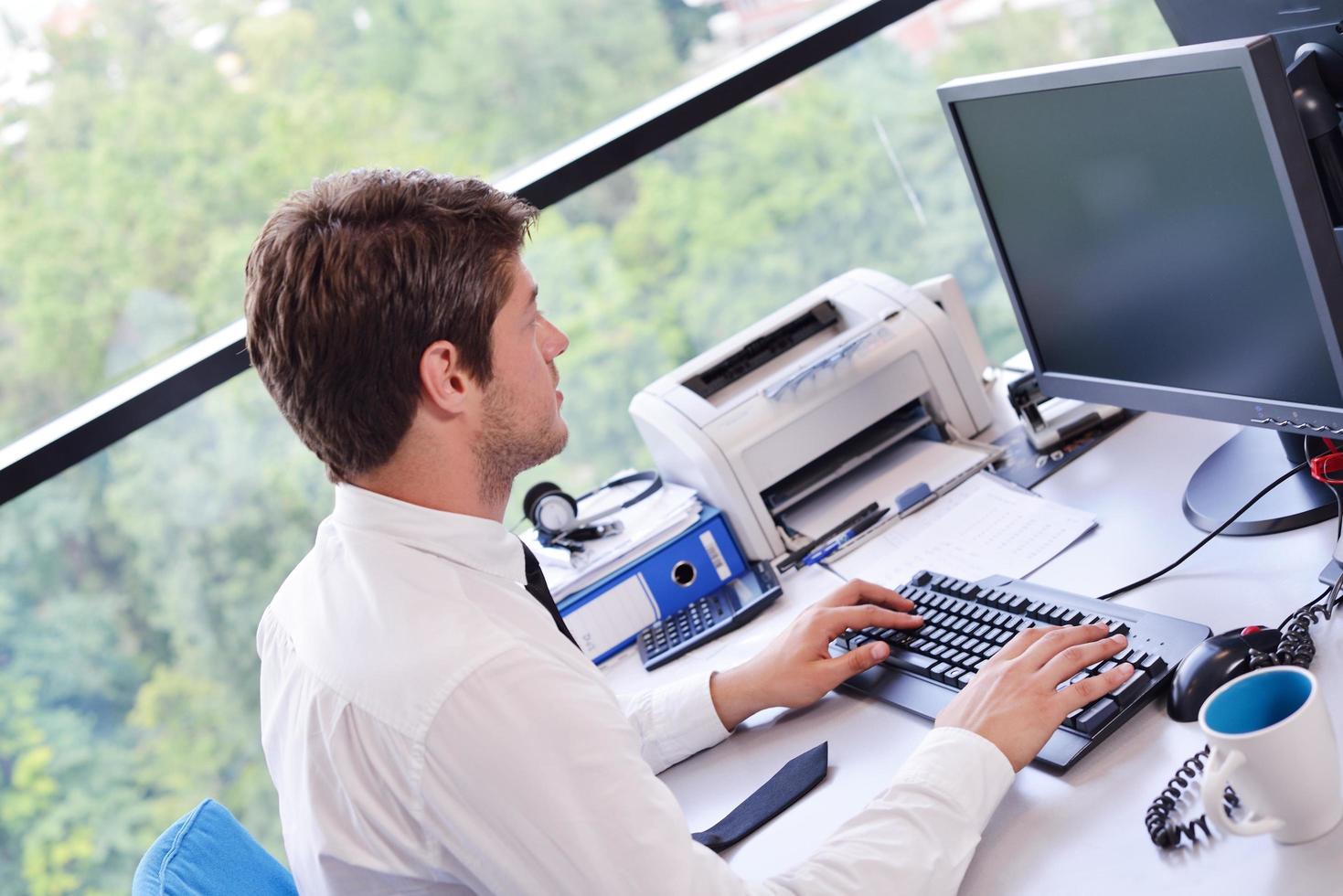 happy young business man at office 12082606 Stock Photo at Vecteezy happy young business man at office 12082606 Stock Photo at Vecteezy