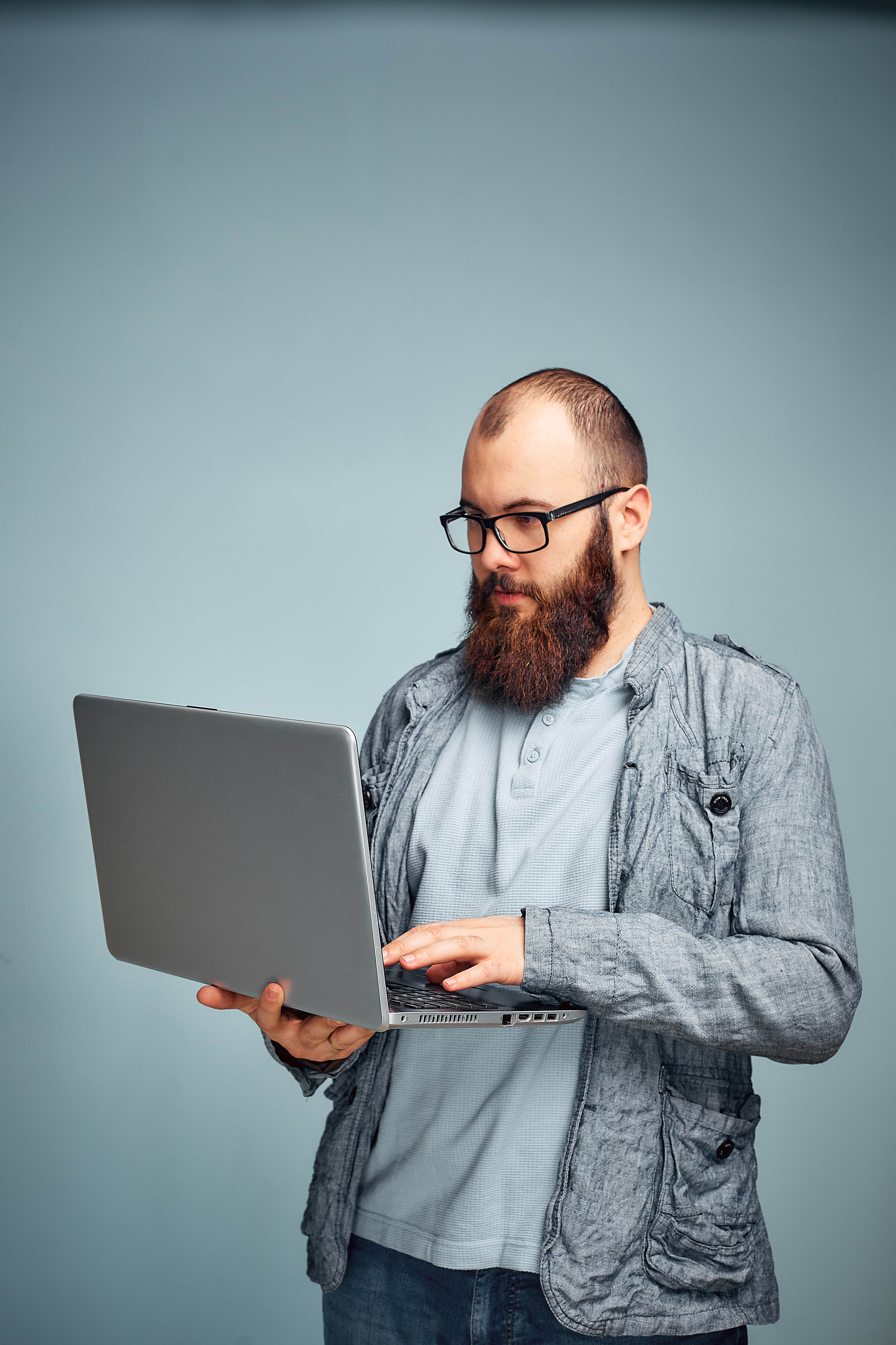 Man With Laptop Stock Photos, Images and Backgrounds for Free Download
