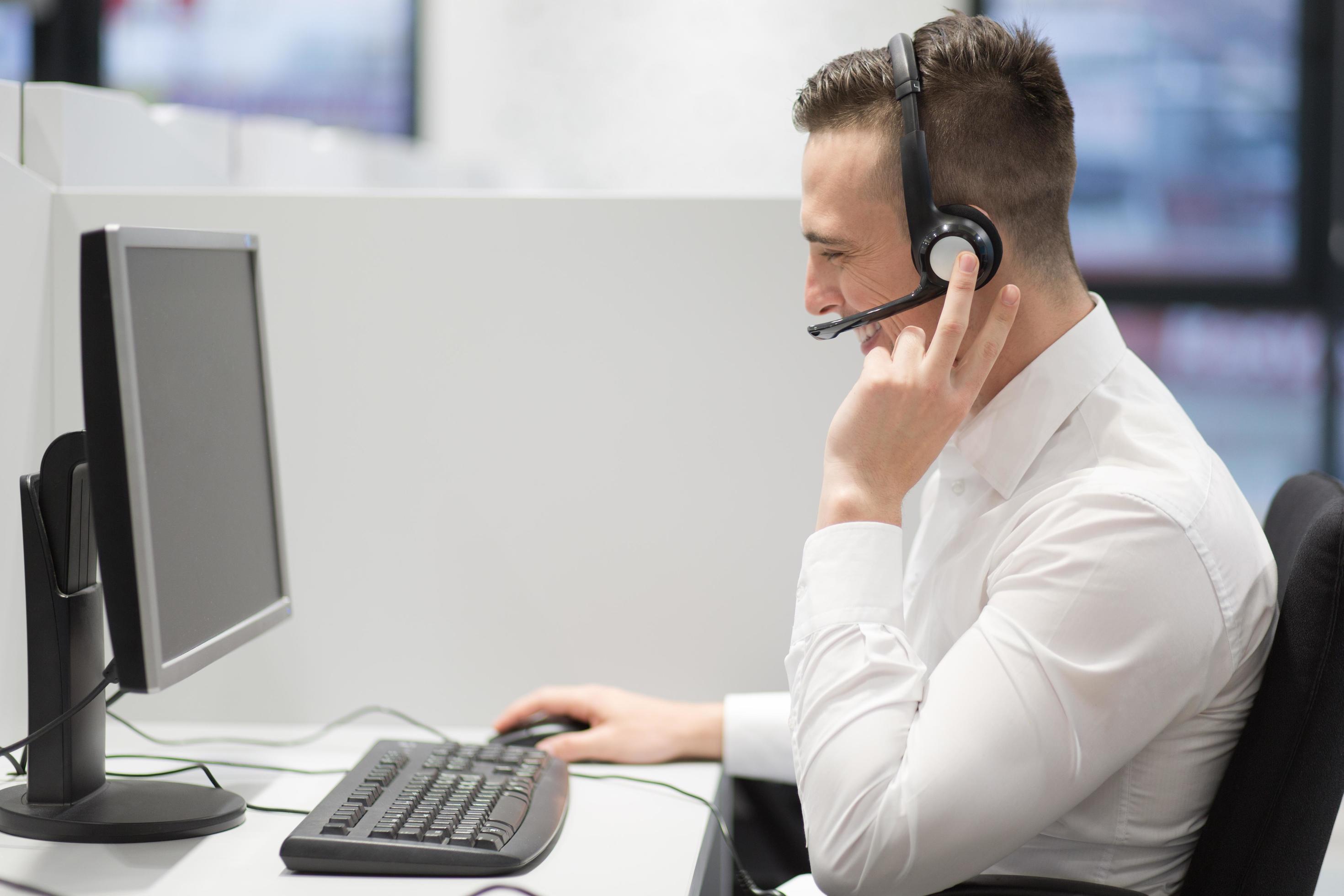 male call centre operator doing his job 12114979 Stock Photo at Vecteezy