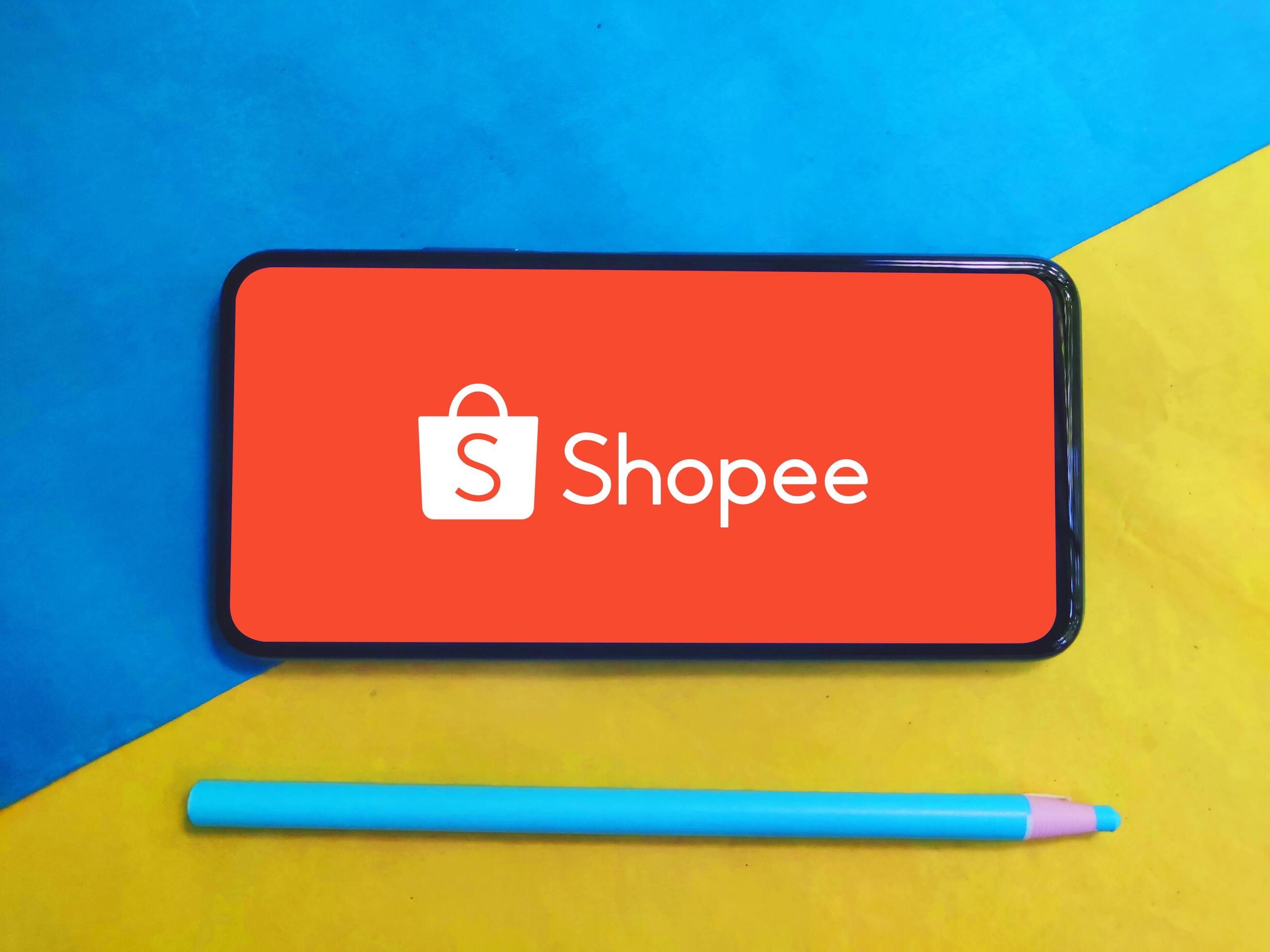 Faridpur, Bangladesh - 21 September 2022 Shopee logo on Mobile screen. Mobile mockup with Shopee ...