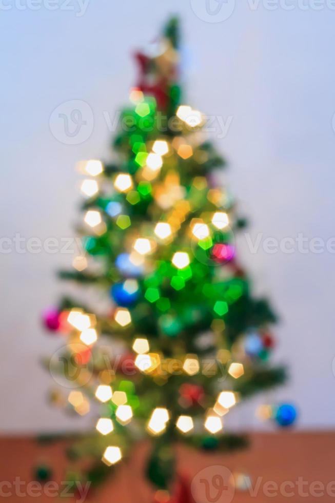 Christmas tree with bokeh light blur background 12202674 Stock Photo at Vecteezy