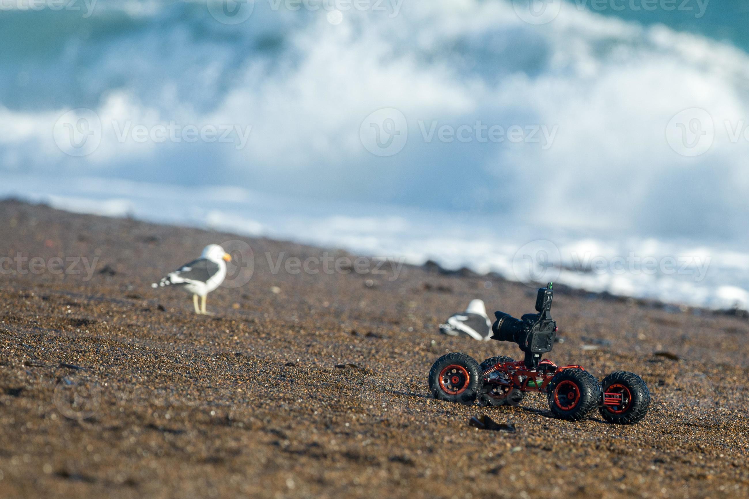 Terrestrial ground drone with camera while driving on the beach 12218989 Stock Photo at Vecteezy