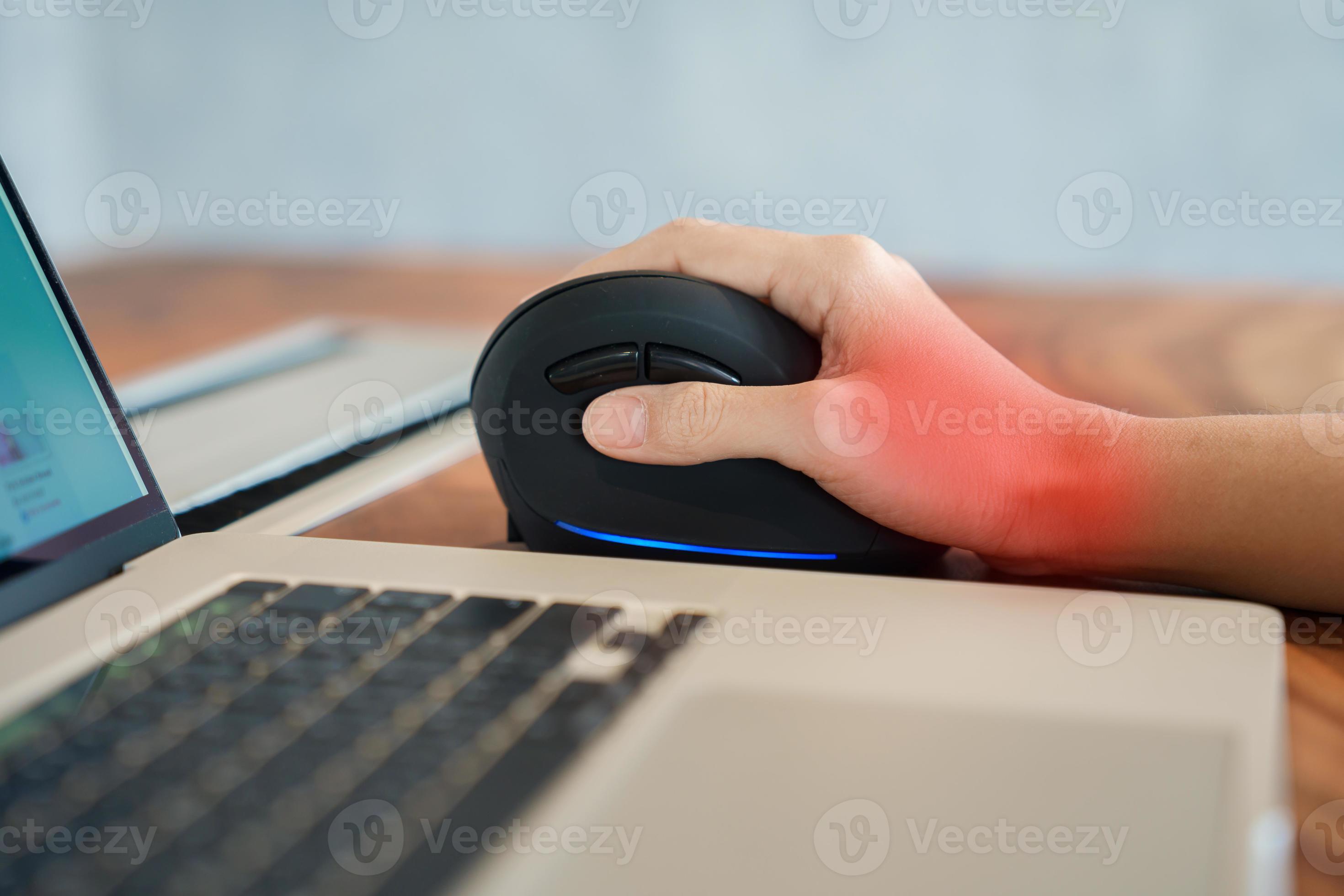 woman hand using computer ergonomic mouse, prevention wrist pain because working long time. De ...