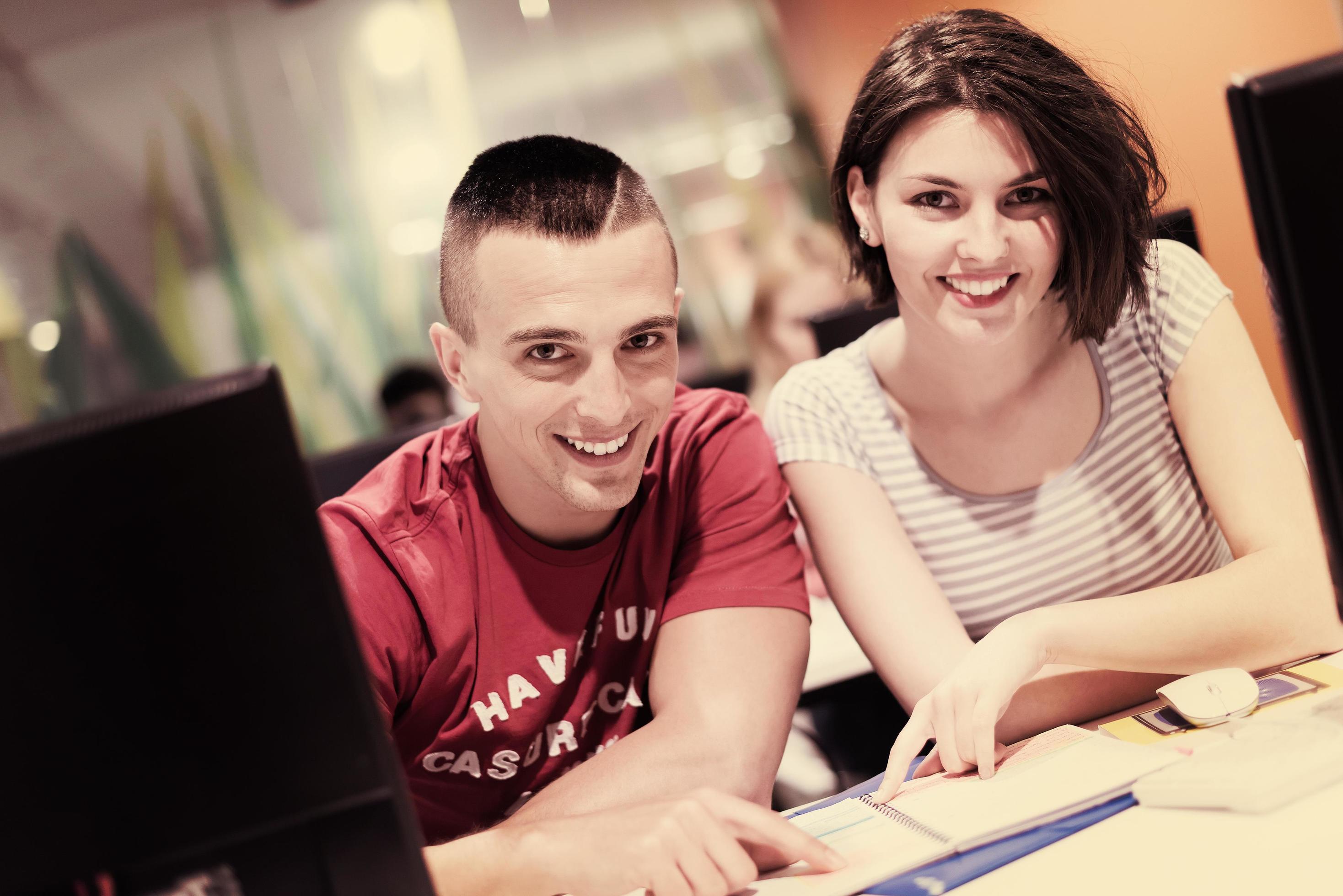 technology students group working in computer lab school classroom ...