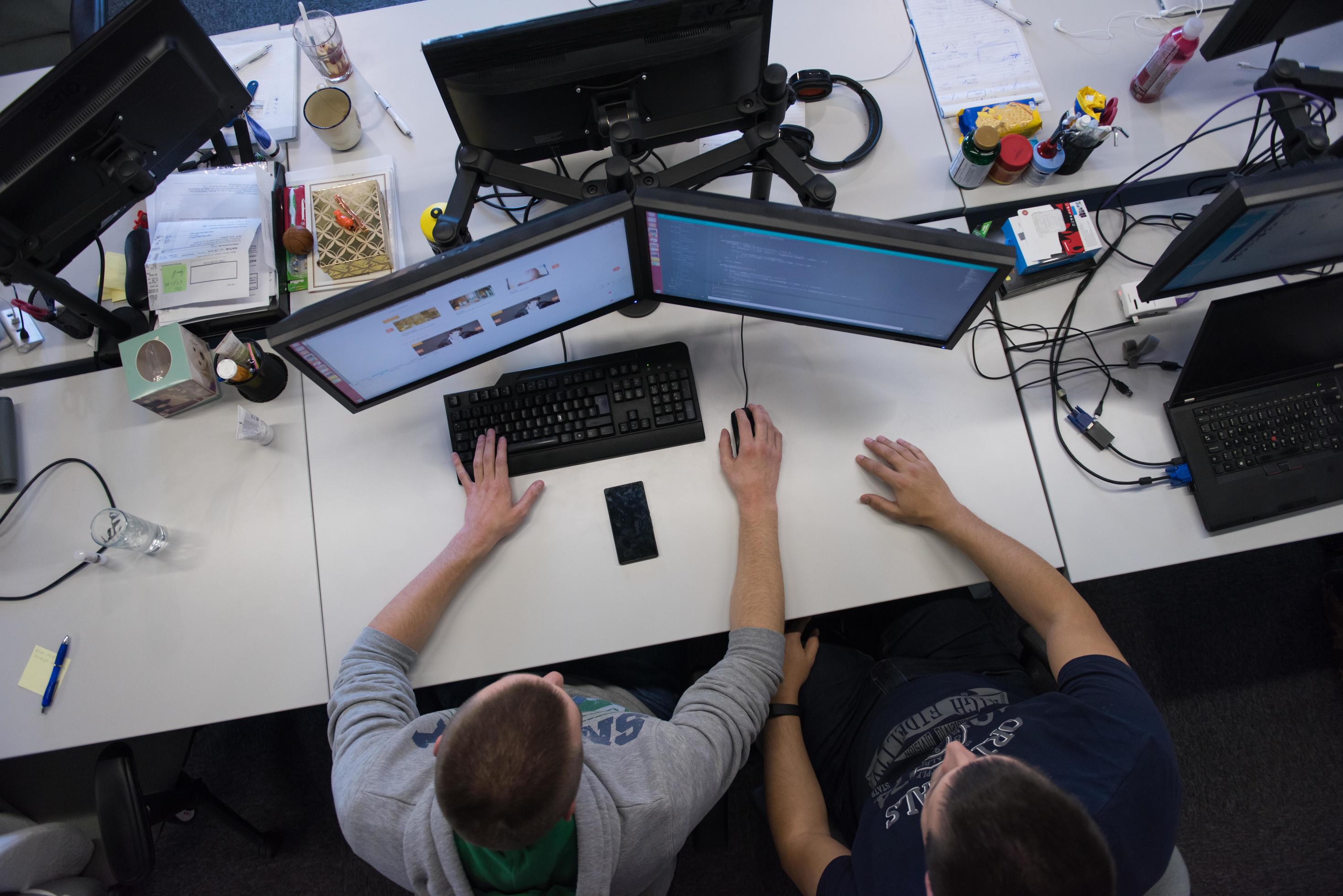 young programmers writing programming code top view 12427502 Stock ...