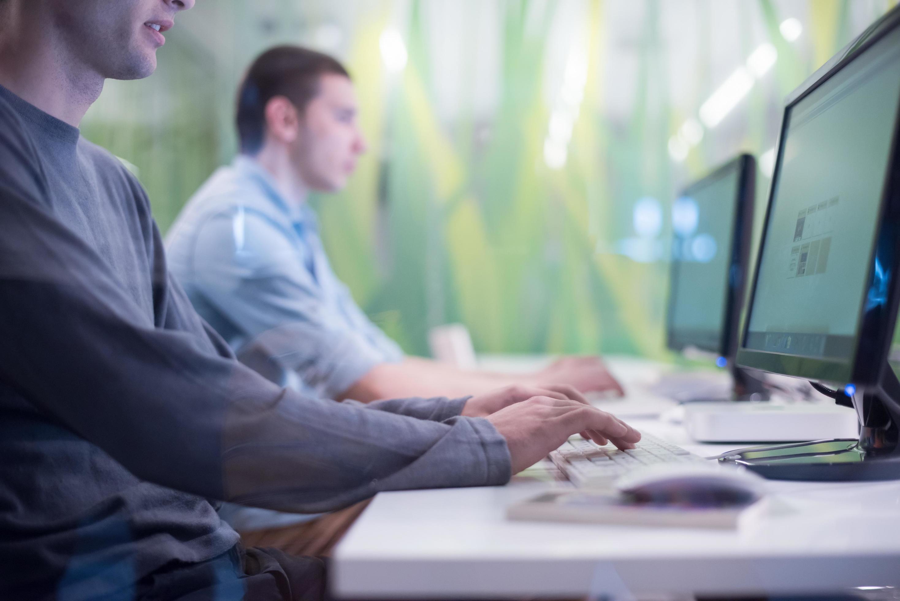 technology students group working in computer lab school classroom ...