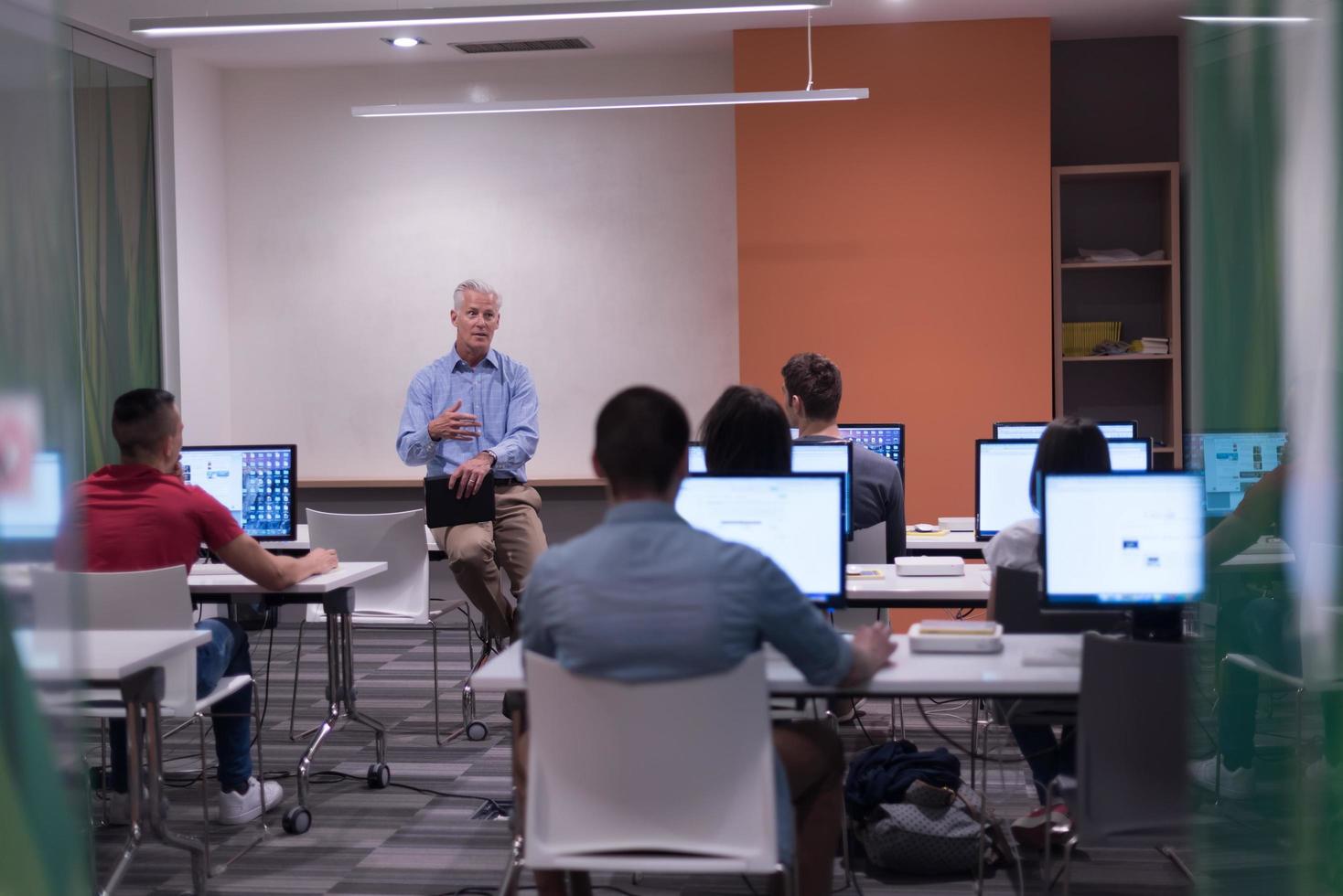 teacher and students in computer lab classroom 12436773 Stock Photo at ...