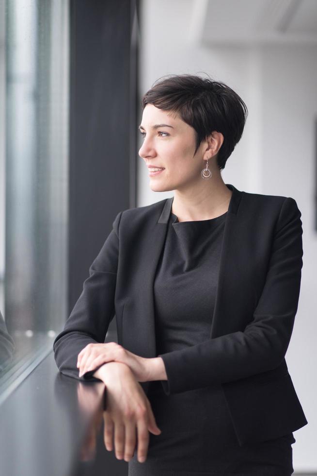 Portrait of successful Businesswoman by the window 12438430 Stock Photo ... Portrait of successful Businesswoman by the window 12438430 Stock Photo ...