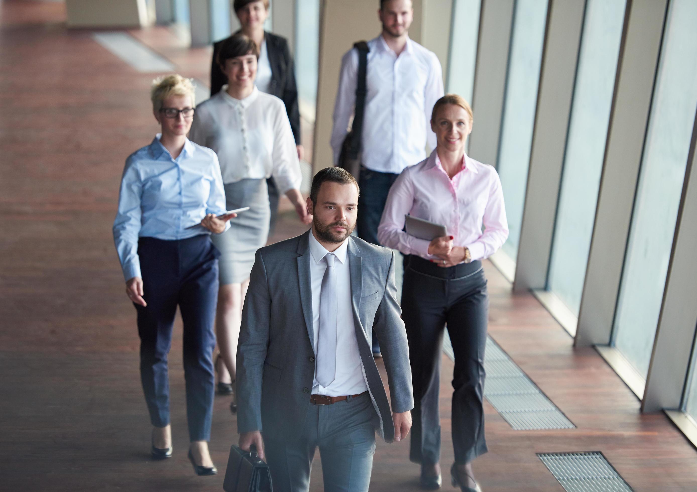 business people group walking 12439422 Stock Photo at Vecteezy