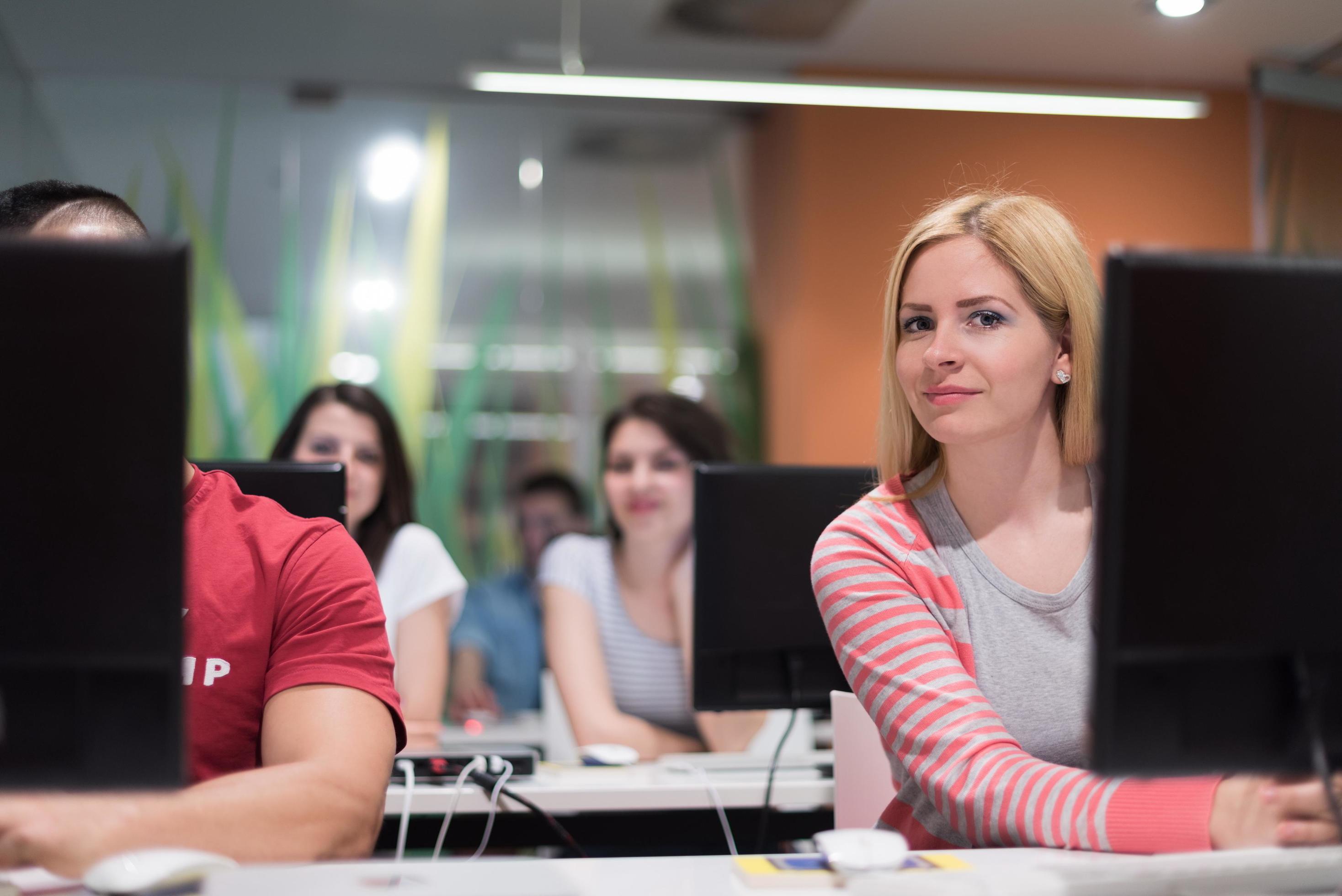 technology students group working in computer lab school classroom 12445894 Stock Photo at Vecteezy