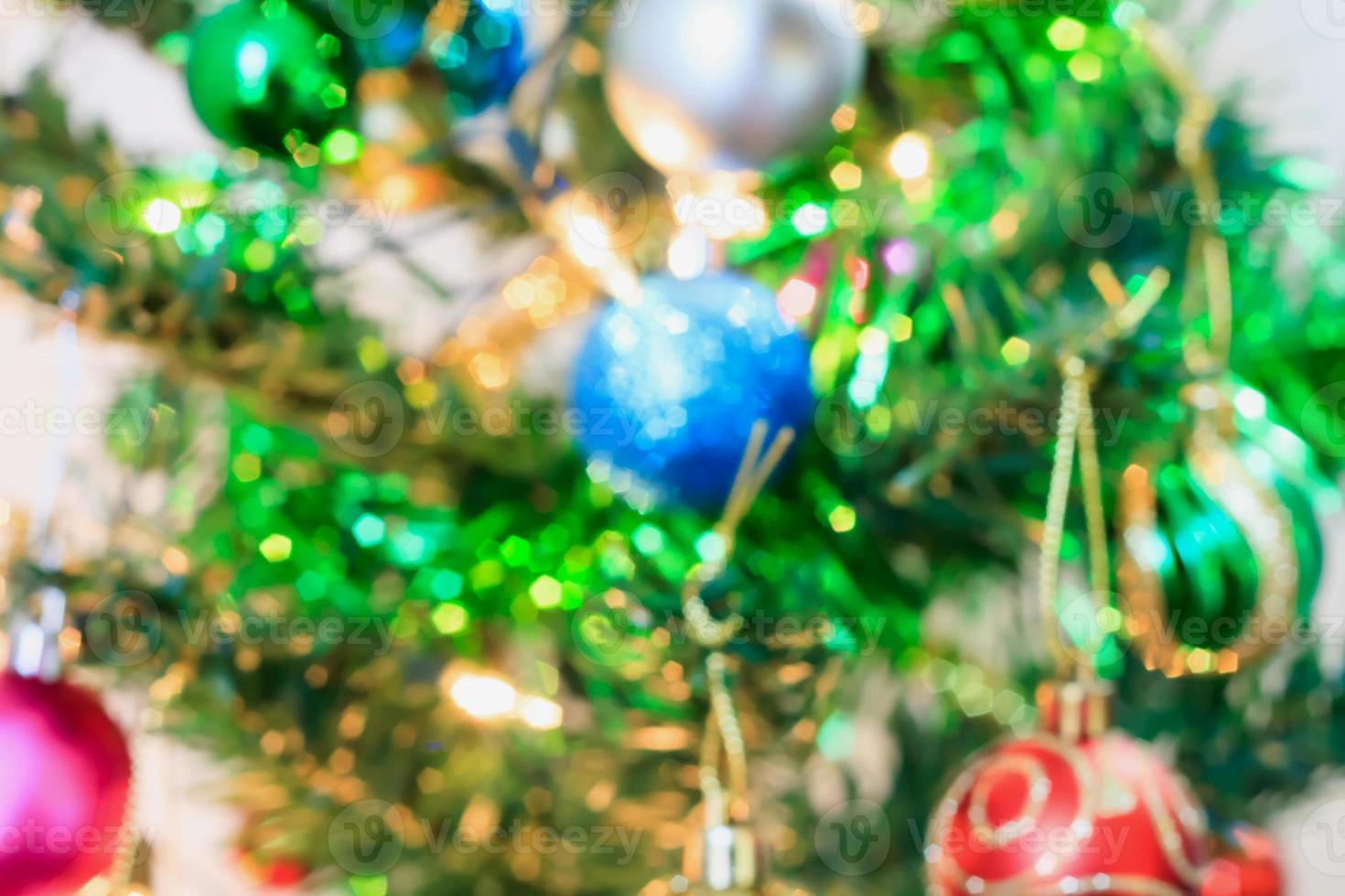 Christmas tree with bokeh light blur background 12471121 Stock Photo at Vecteezy