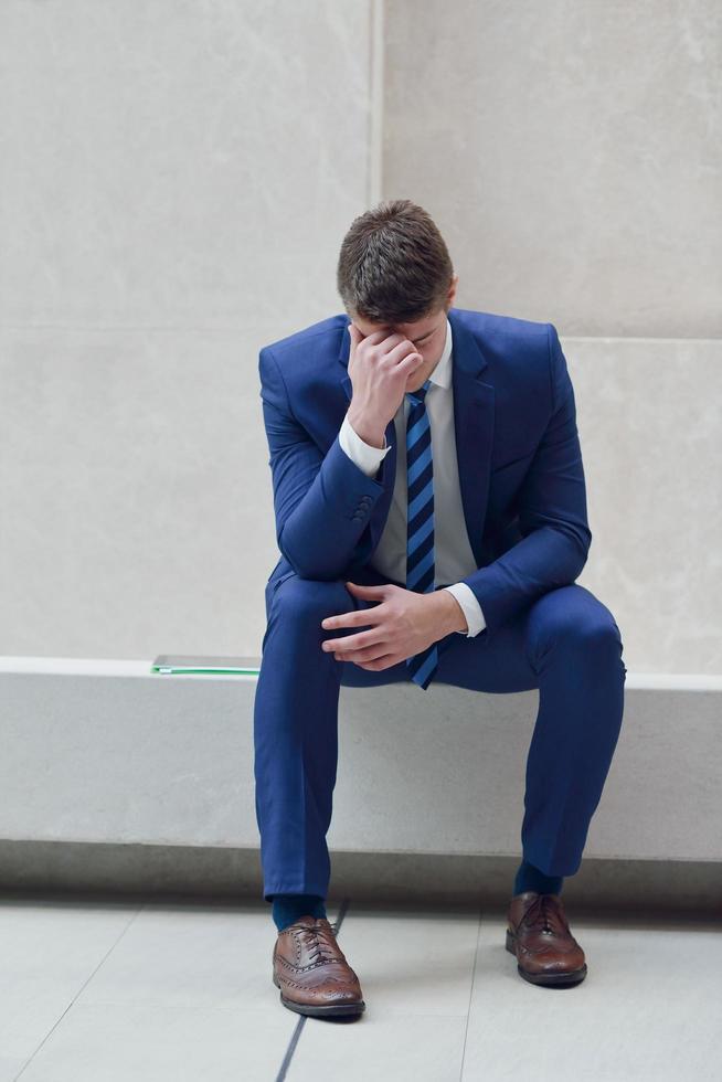 frustrated young business man 12489654 Stock Photo at Vecteezy