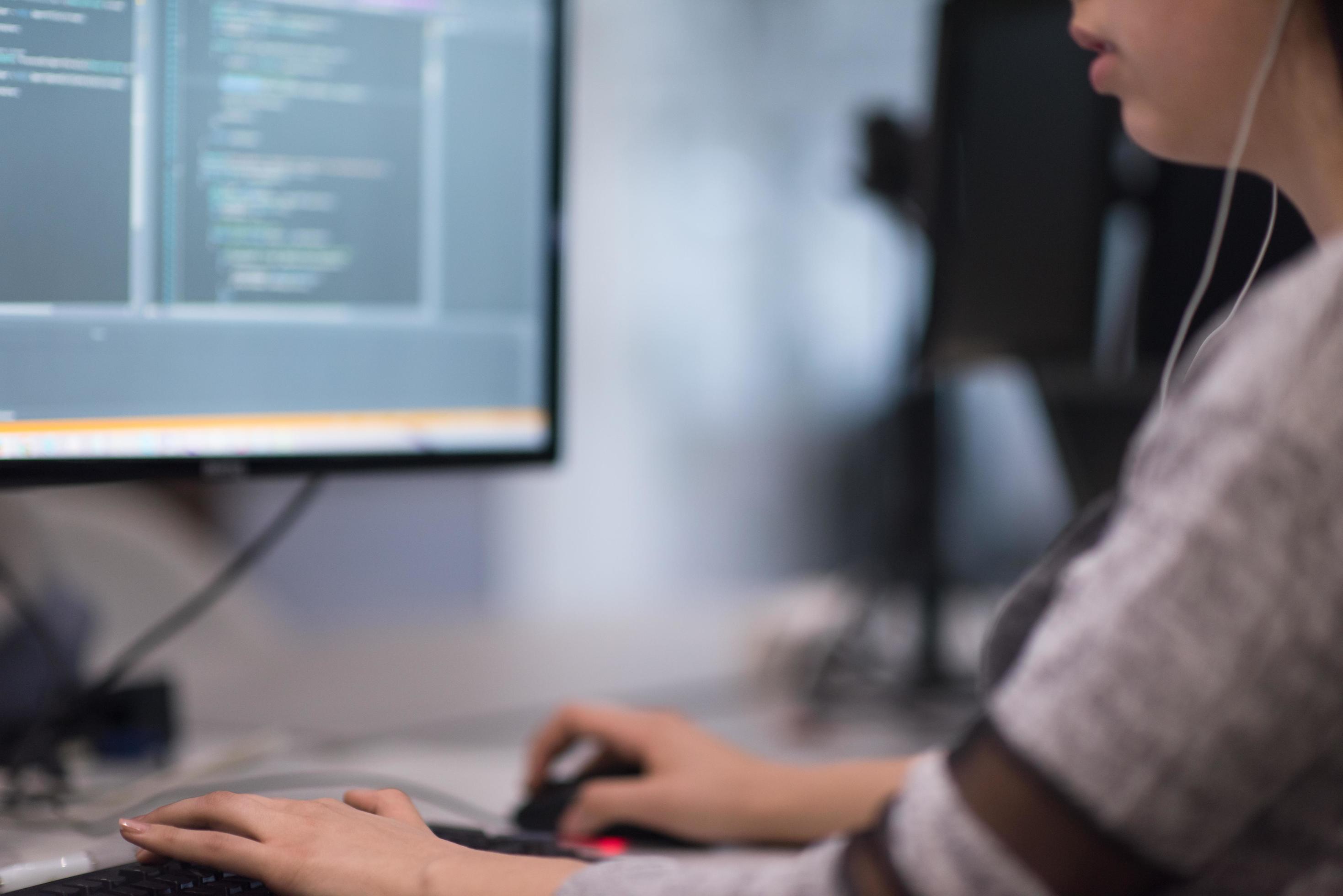 young programmer writing programming code 12504734 Stock Photo at Vecteezy