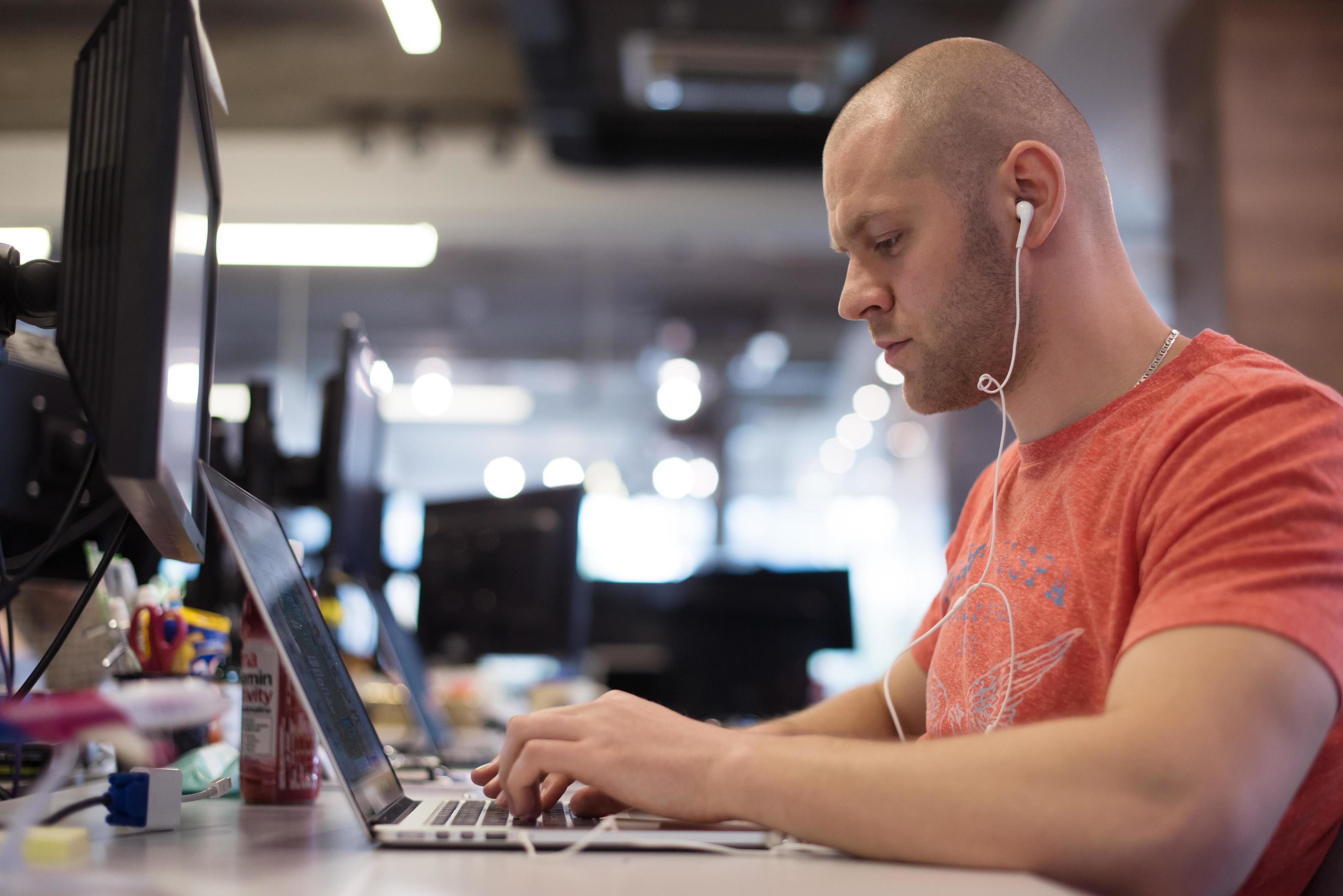 programmer writing programming code 12507115 Stock Photo at Vecteezy