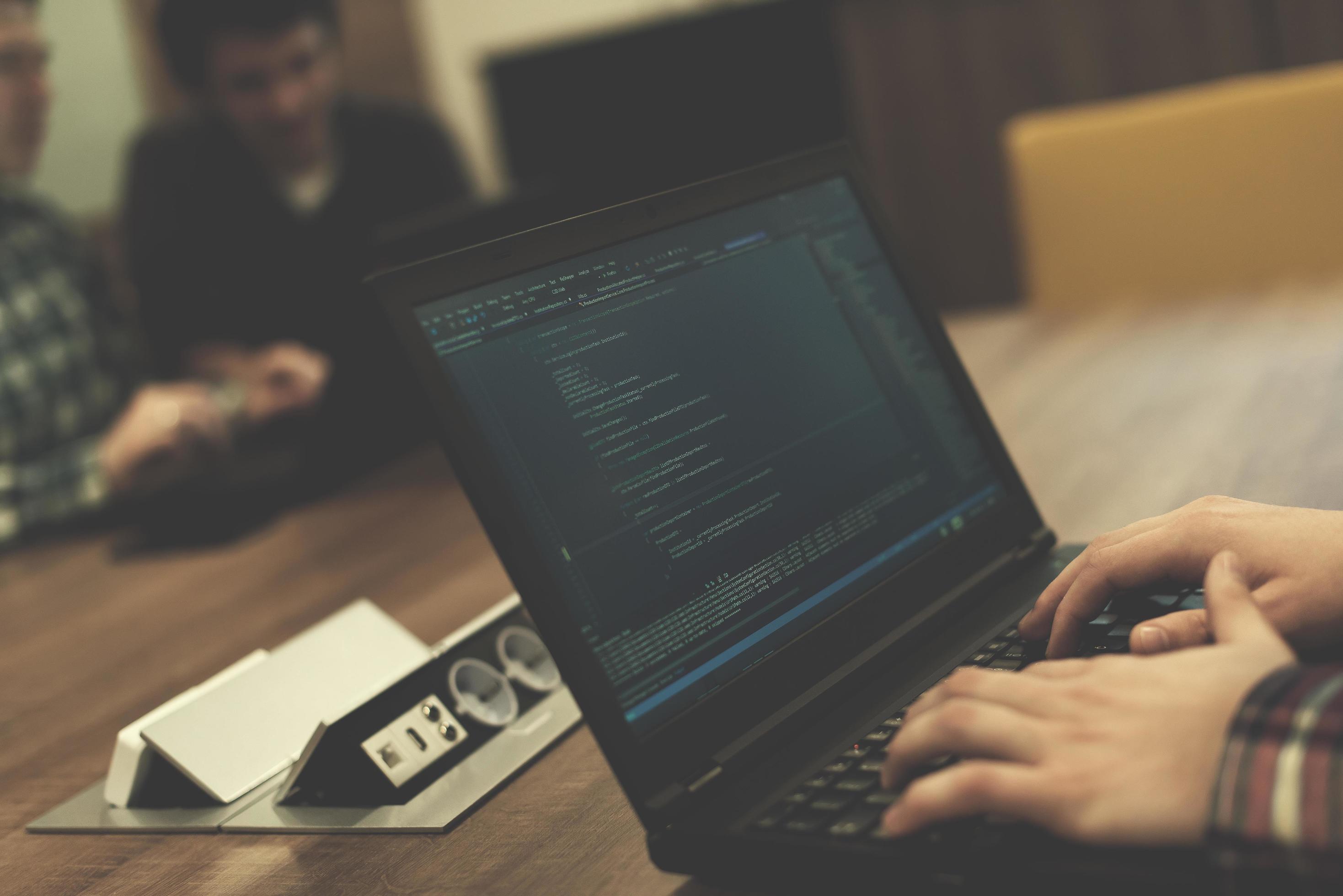 programmer writing programming code 12509691 Stock Photo at Vecteezy