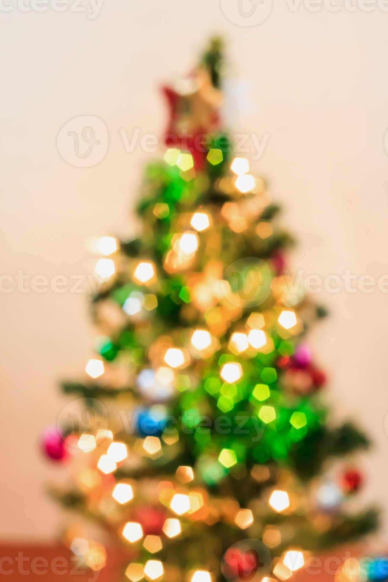 Christmas tree with bokeh light blur background 12567023 Stock Photo at Vecteezy