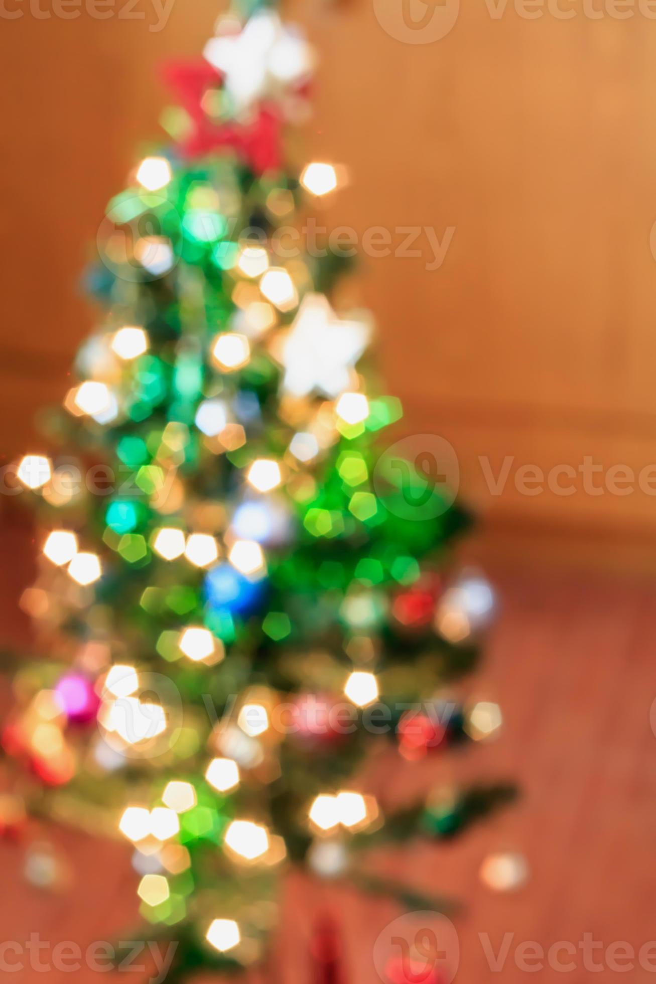 Christmas tree with bokeh light blur background 12602776 Stock Photo at Vecteezy