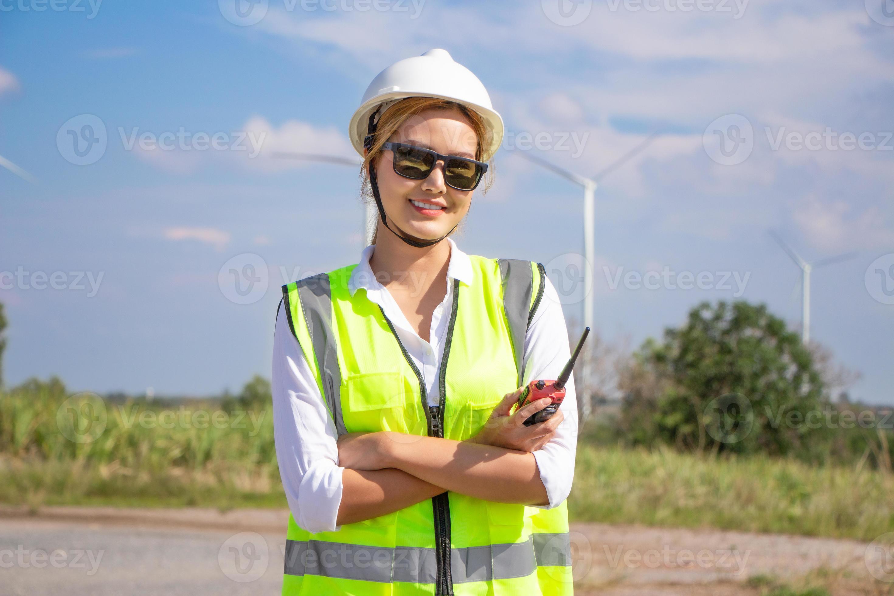 engineer team working in wind turbine farm. Renewable energy with wind generator by alternative ...