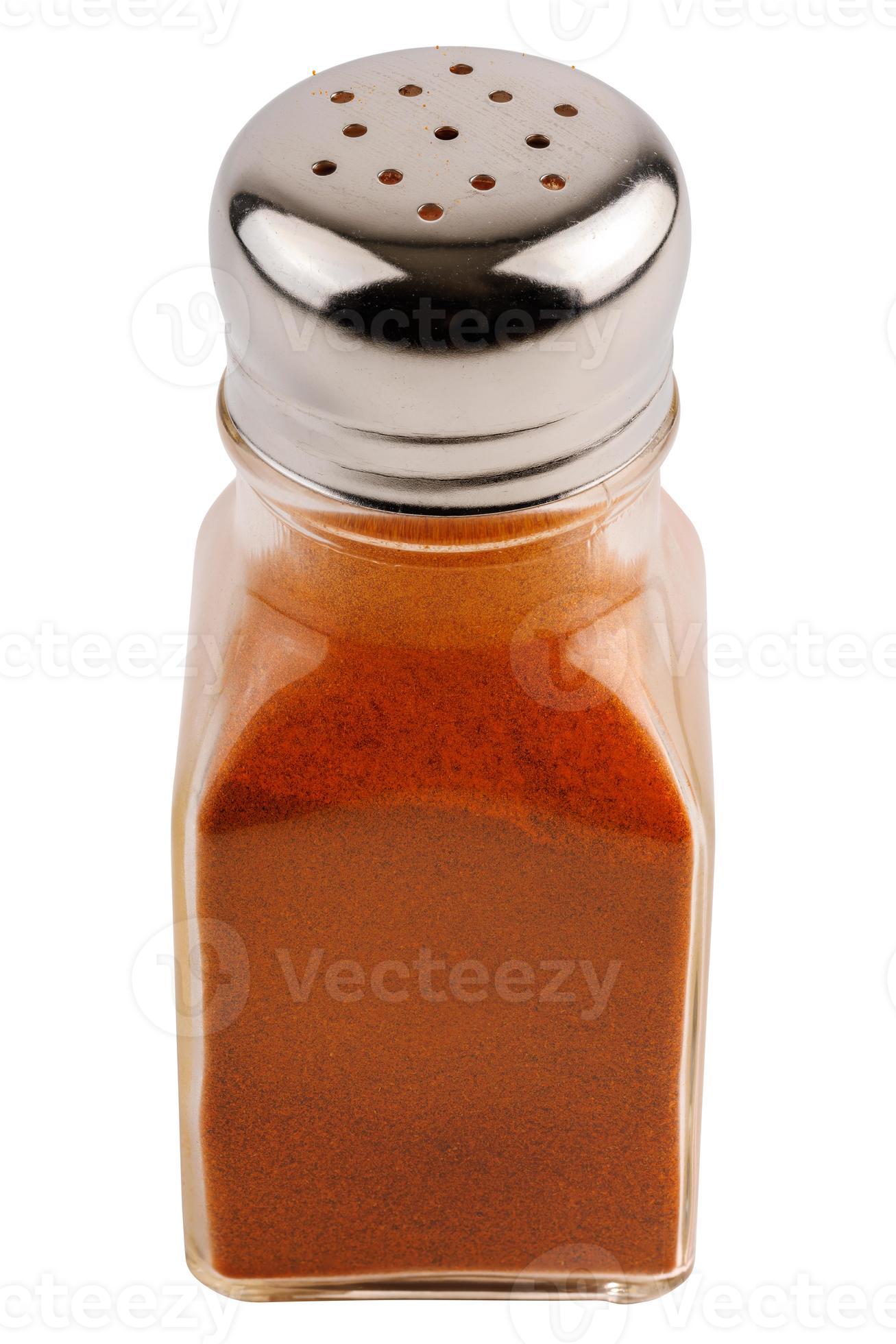 Glass Pepper Pot With Ground Red Paprika Pepper Isolated On White glass-pepper-pot-with-ground-red-paprika-pepper-isolated-on-white