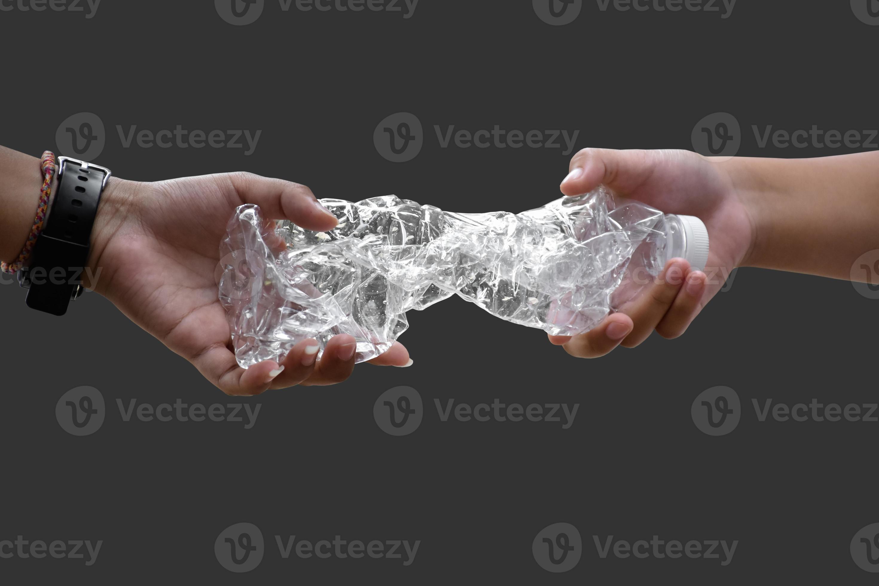 Giving Plastic Bottle To Make Recyclying Reusing And Reducing Objects To Lower Garbage And To