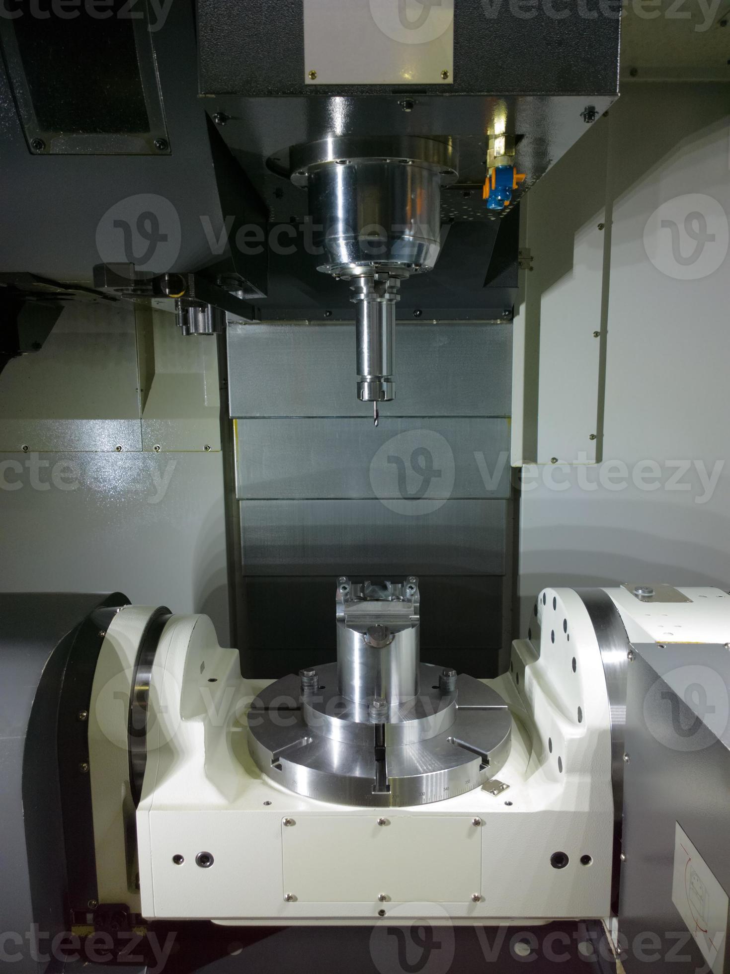 The Five Axis Computer Numerical Control Cnc Machine Waiting For Stock
