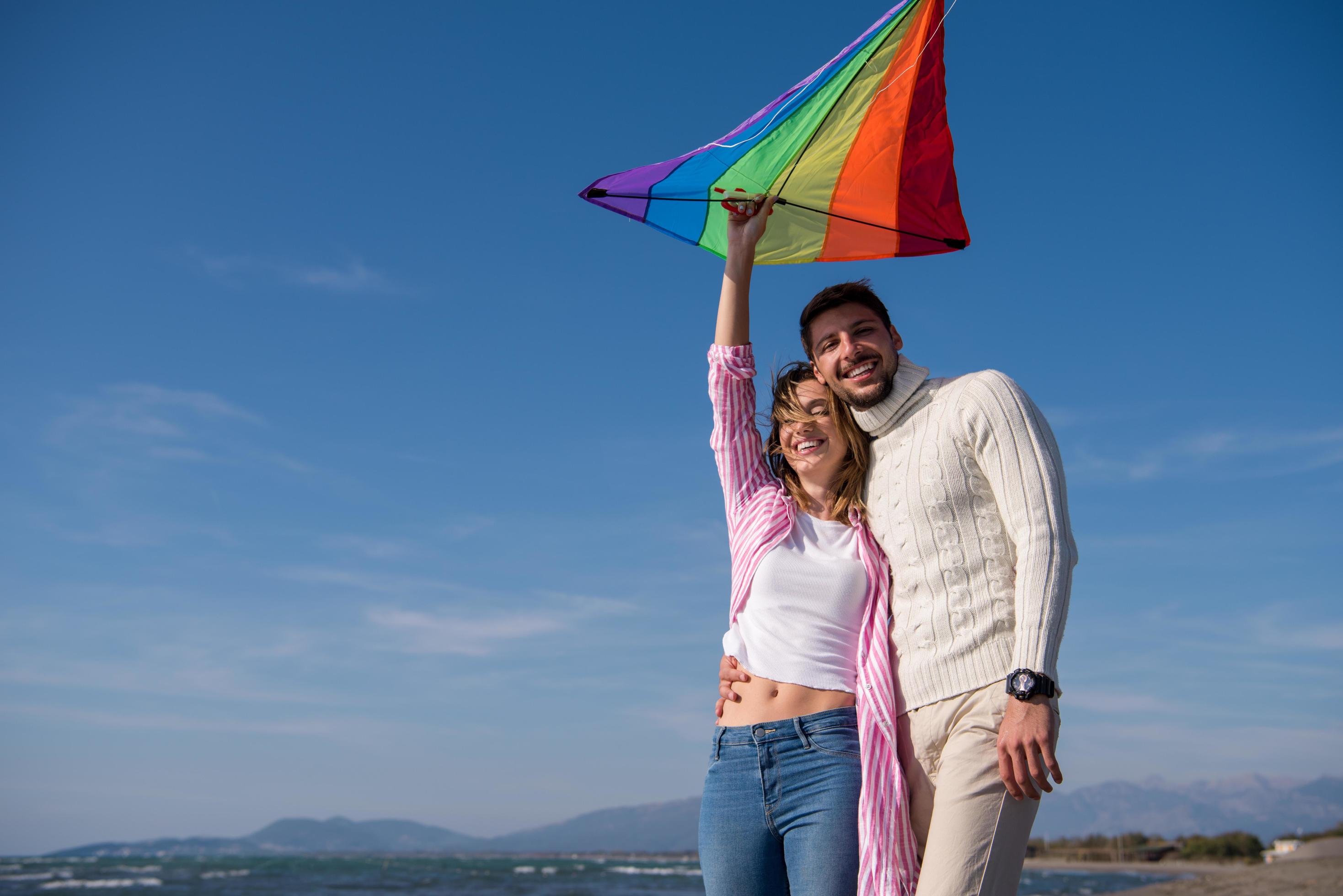 Couple enjoying time together at beach 12641121 Stock Photo at Vecteezy Couple enjoying time together at beach 12641121 Stock Photo at Vecteezy