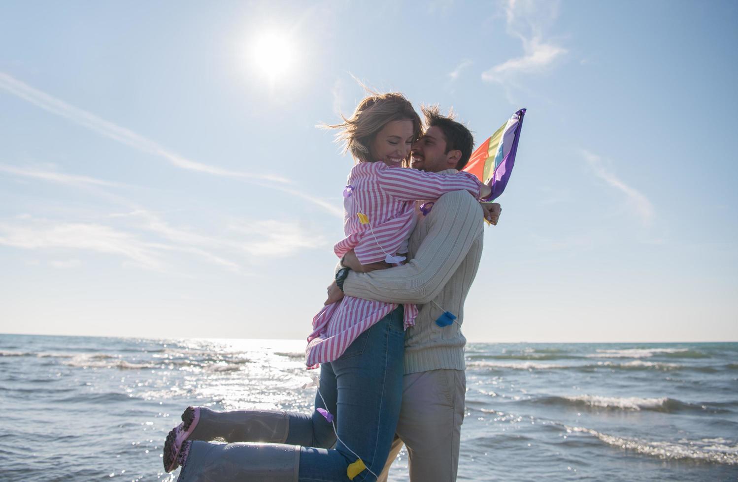 Couple enjoying time together at beach 12644644 Stock Photo at Vecteezy