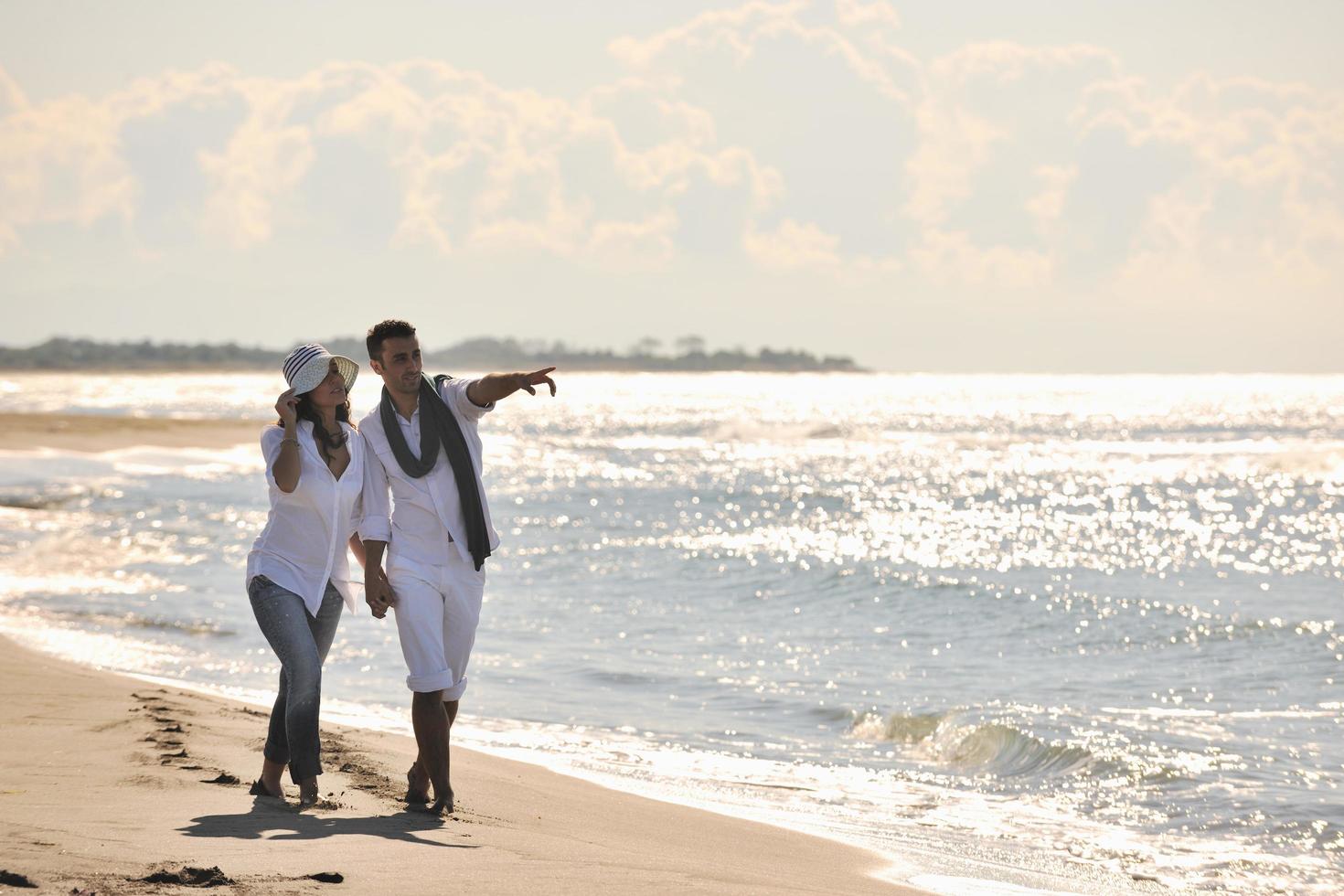 happy young couple have fun at beautiful beach 12651185 Stock Photo at Vecteezy