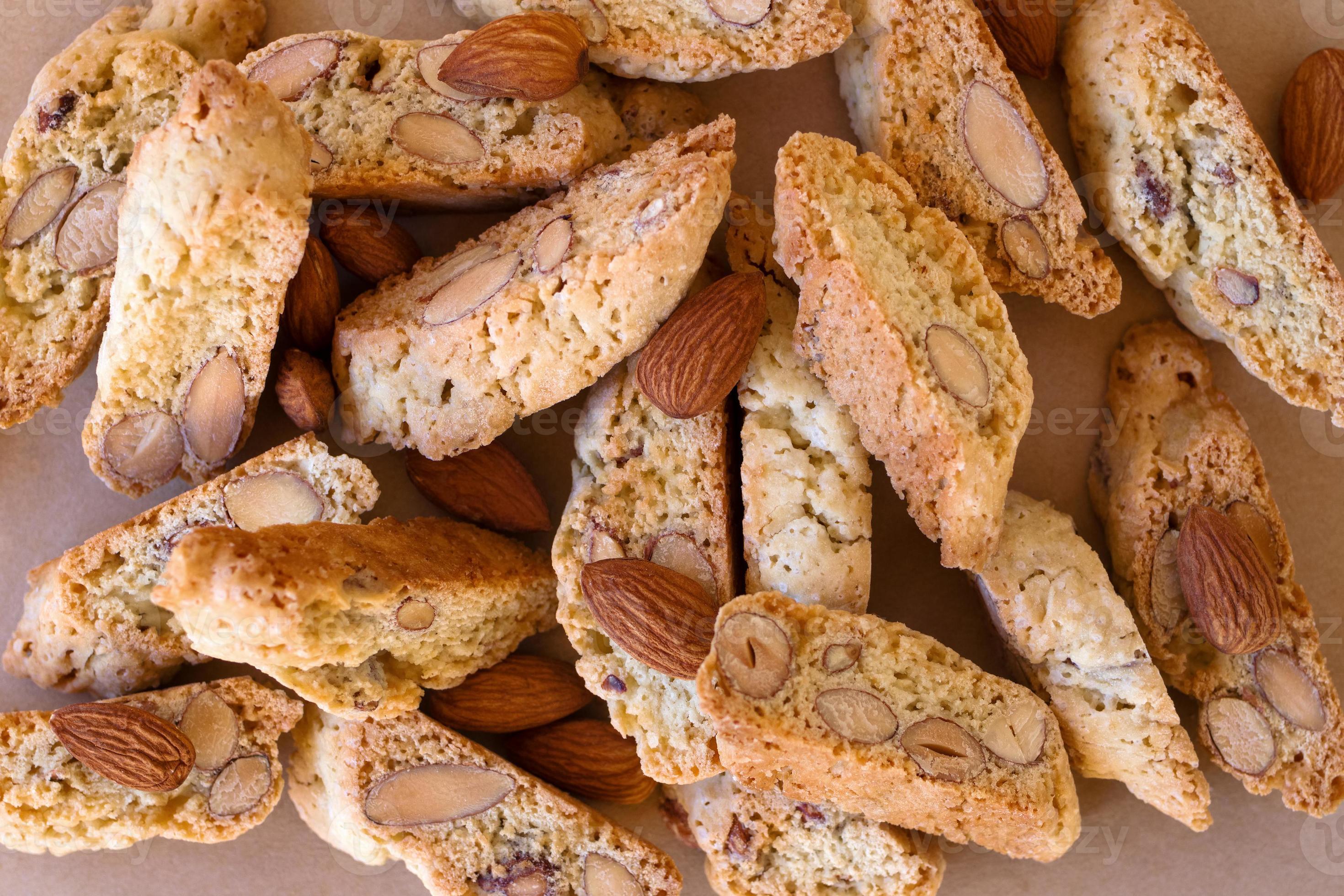 Sweet almond cookies - cantuccini or biscotti on craft paper, top view. Traditional dessert of ...