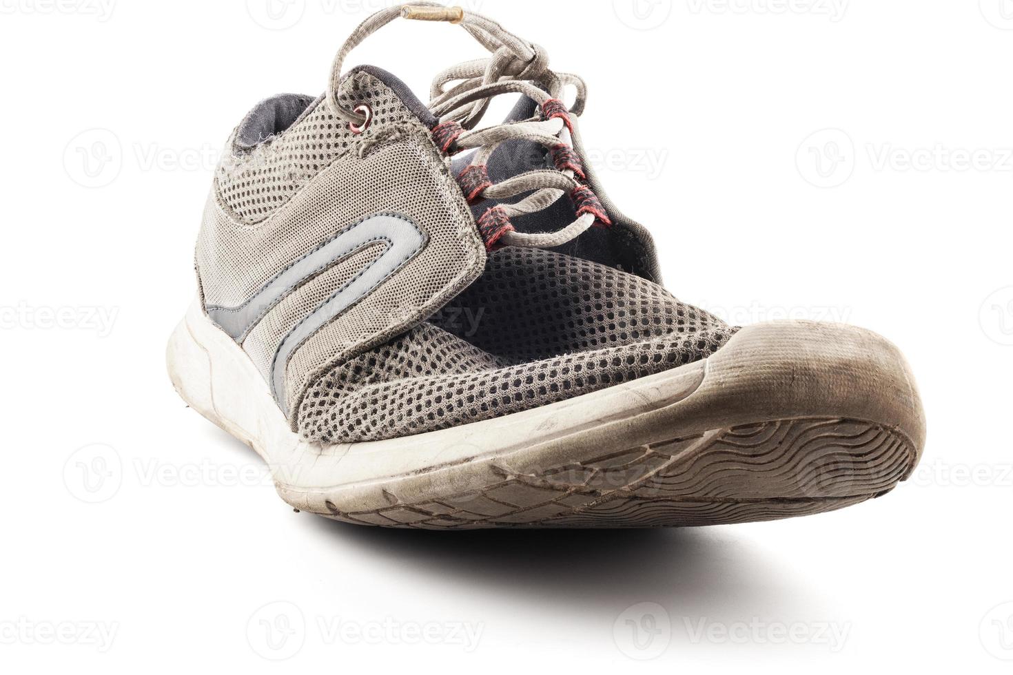 one worn out sneaker isolated on white background 12670359 Stock Photo ...
