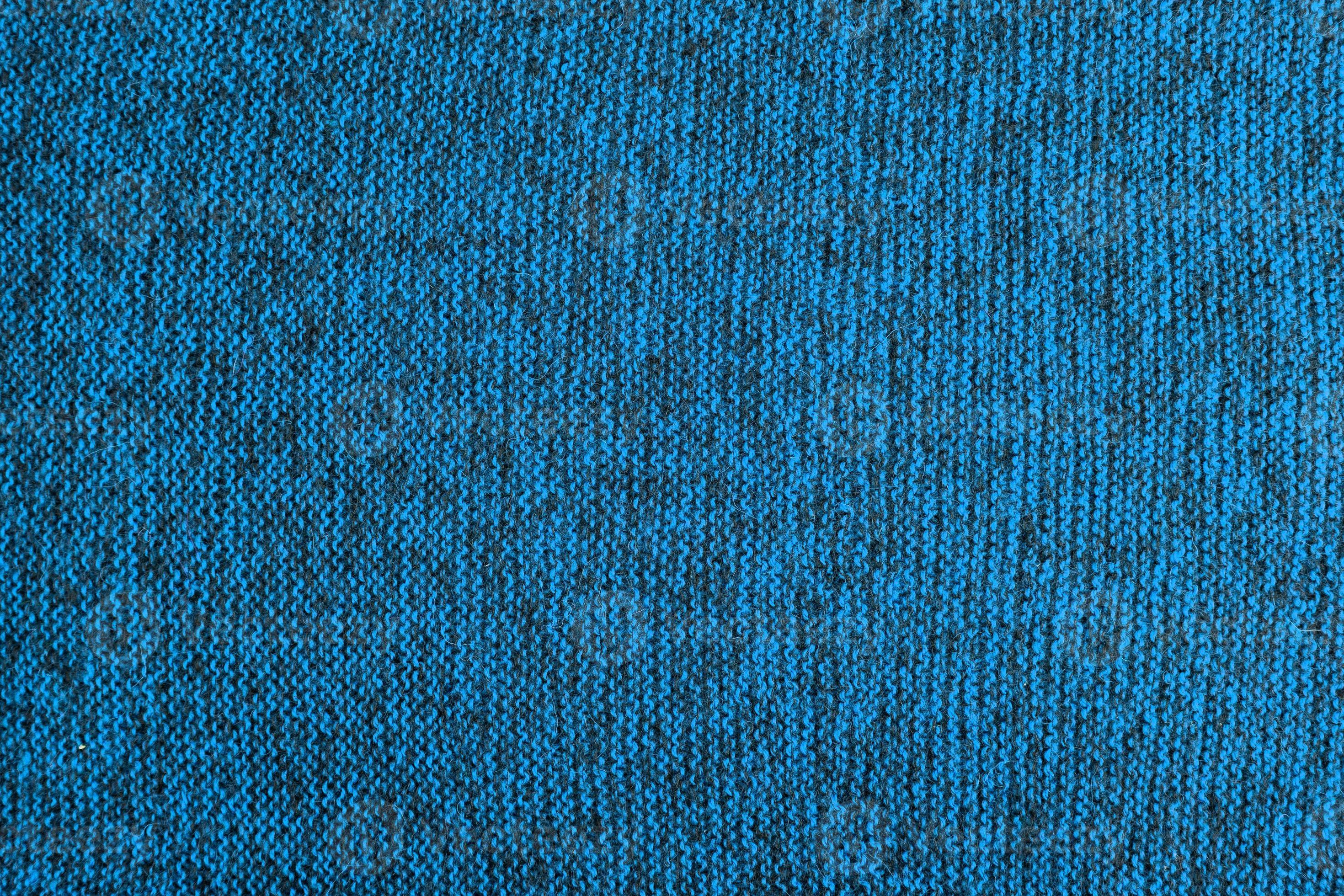 Light Blue And Black Melange Knitted Texture And Flat Background light-blue-and-black-melange-knitted-texture-and-flat-background