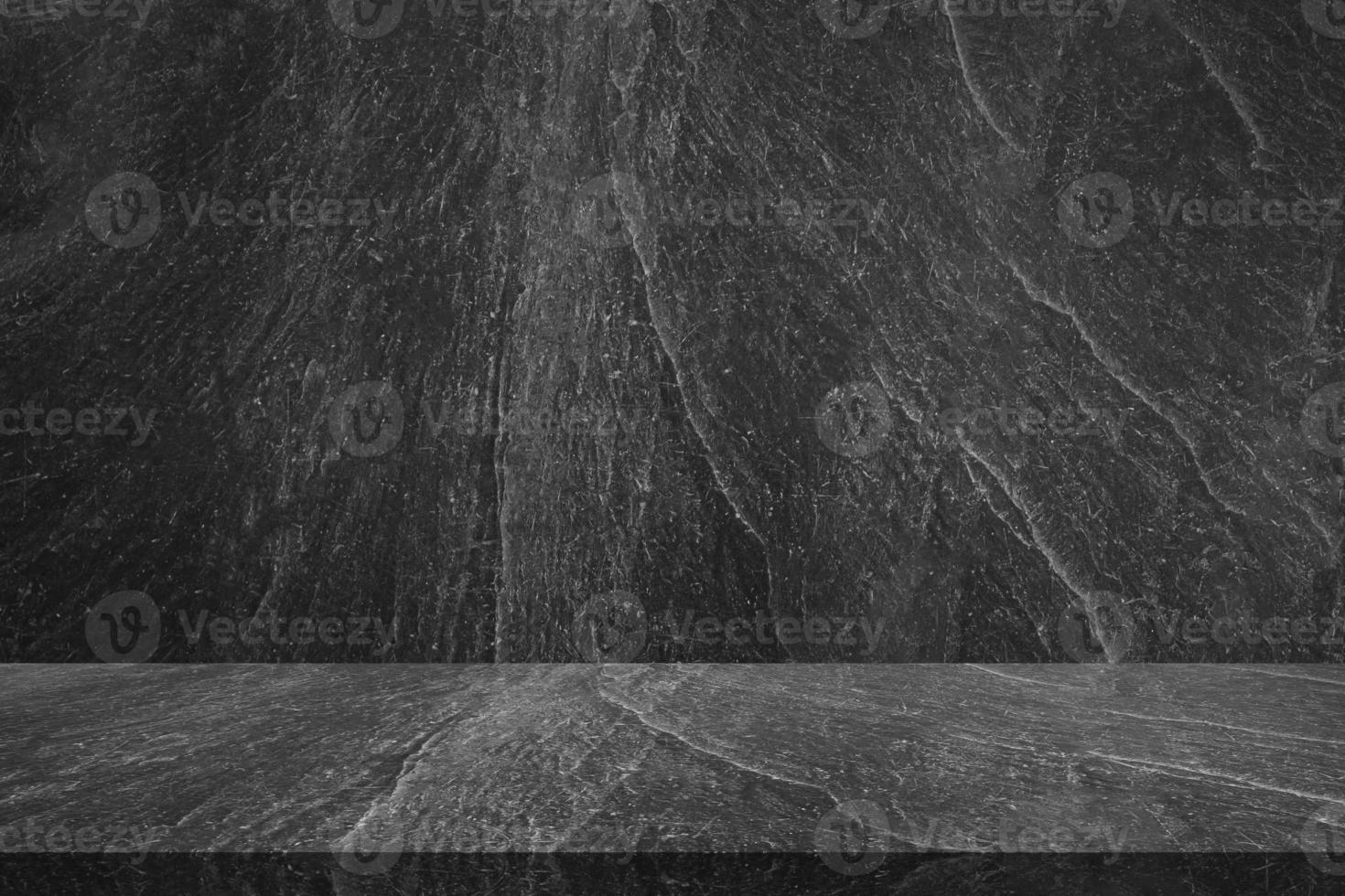 Empty black marble table top with black stone wall texture background ...