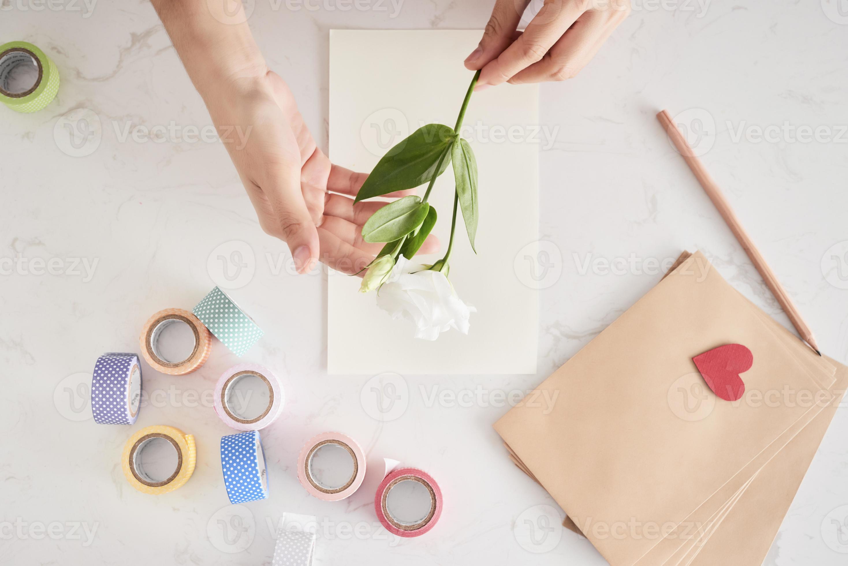 Hands of woman making birthday card, view from the top 12746225 Stock ... Hands of woman making birthday card, view from the top 12746225 Stock ...
