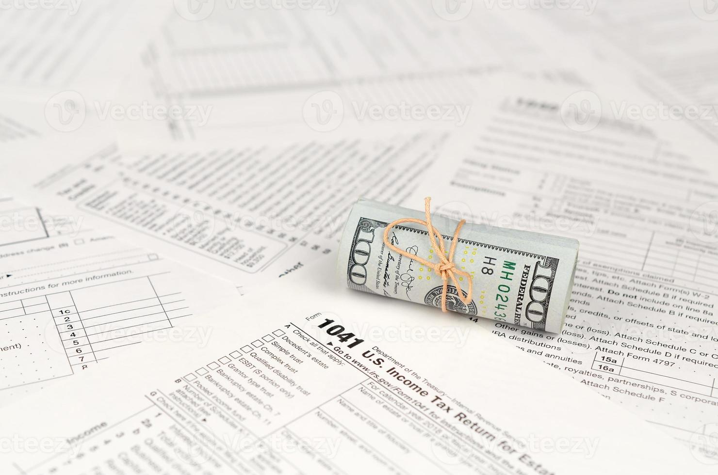 1041 U.S. Income tax return for Estates and Trusts form with roll of ... 1041 U.S. Income tax return for Estates and Trusts form with roll of ...