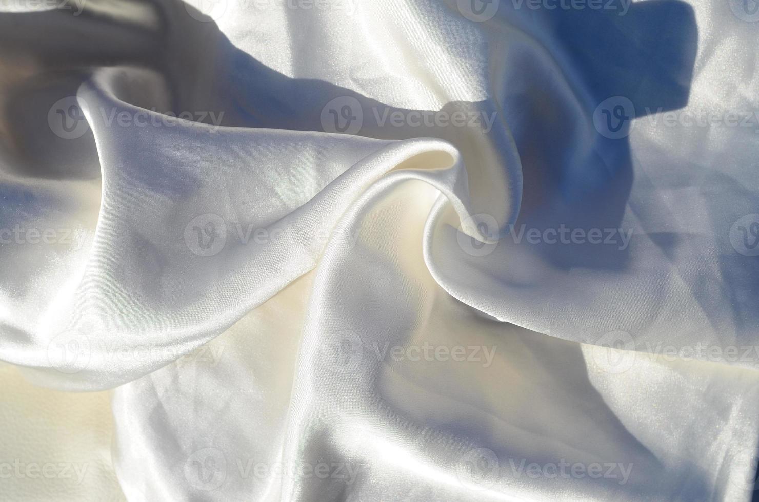 Smooth elegant white silk or satin luxury cloth texture can use as ...