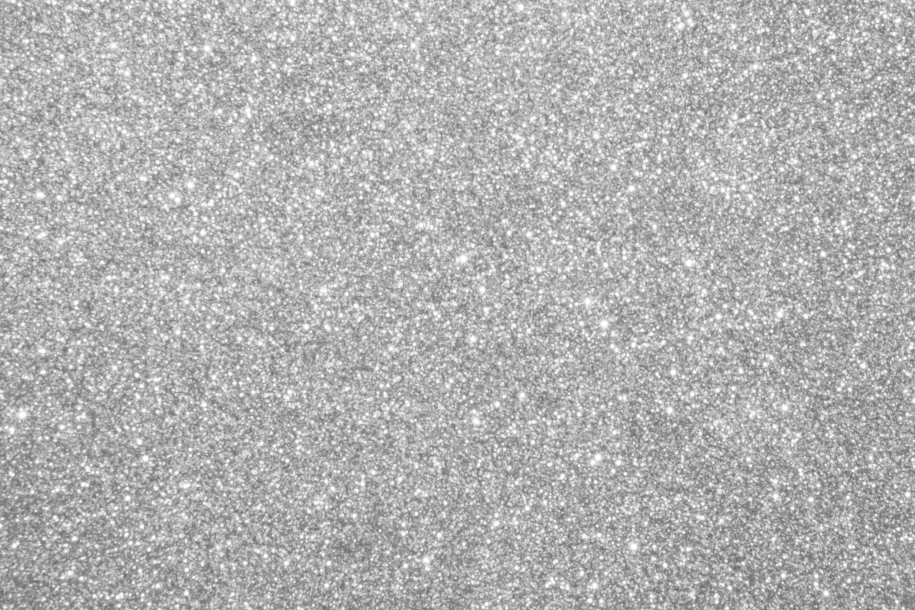Abstract silver glitter sparkle defocused light background 12834890 Stock Photo at Vecteezy