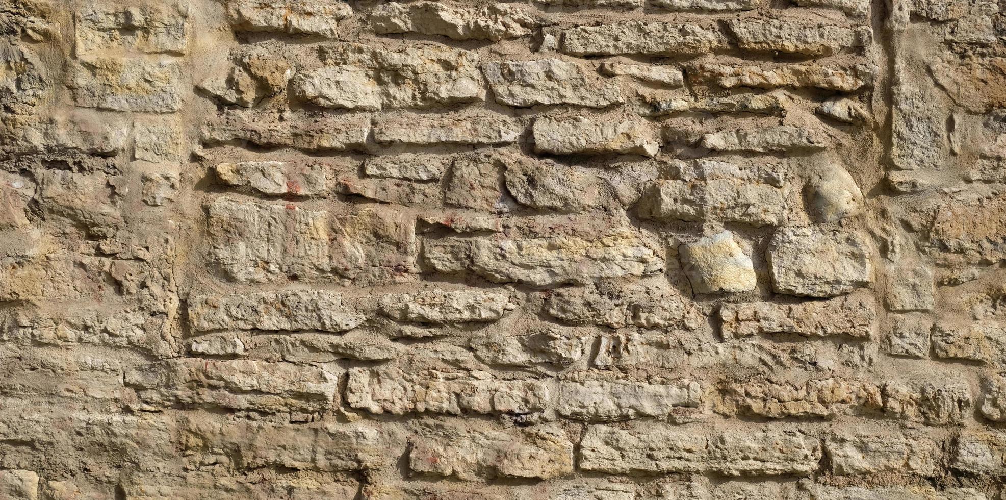 textura de una pared de piedra beige. superficie lisa y agrietada ... textura de una pared de piedra beige. superficie lisa y agrietada ...