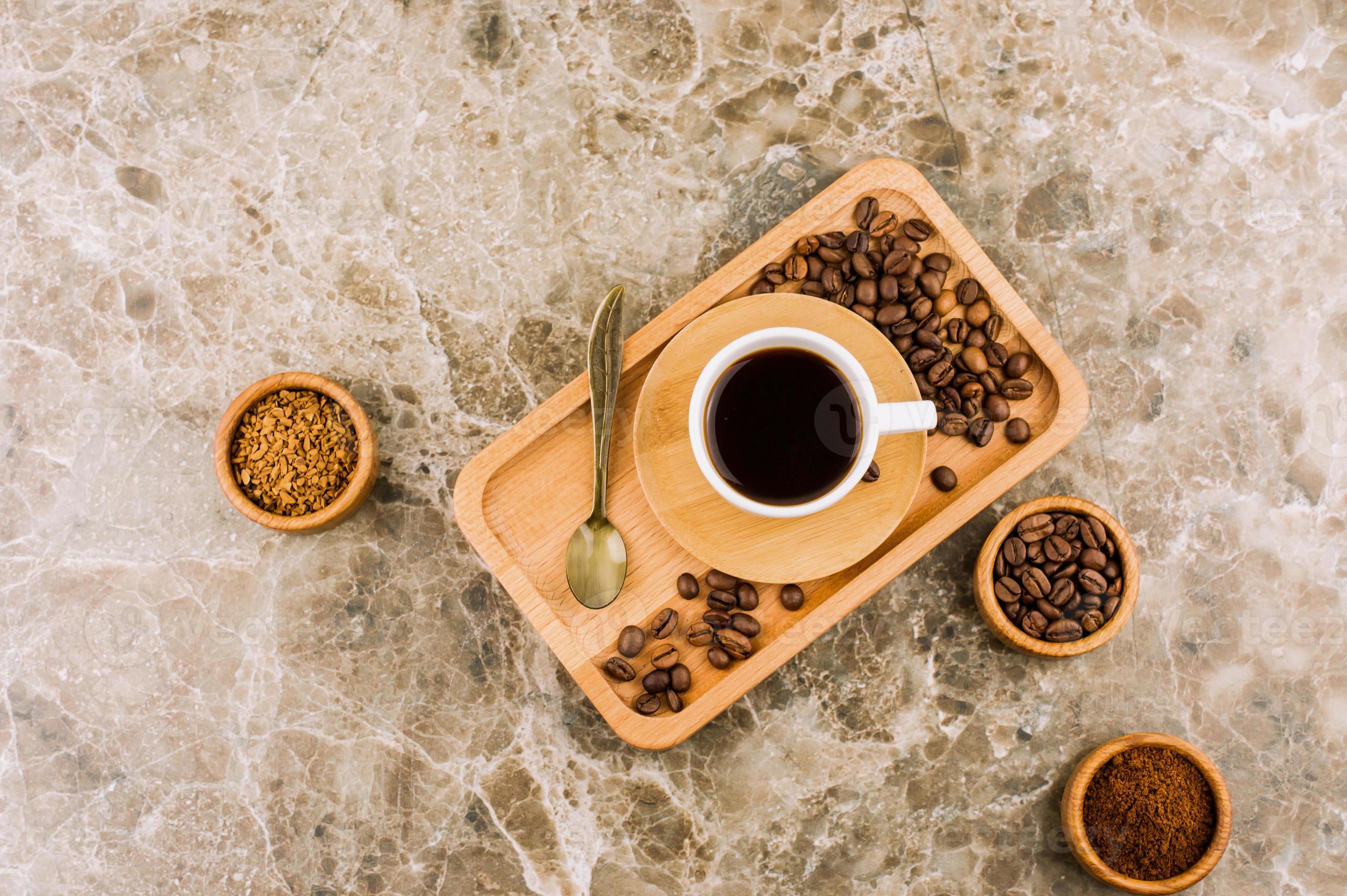 top view of a wooden tray with a cup of aromatic coffee and wooden ... top view of a wooden tray with a cup of aromatic coffee and wooden ...