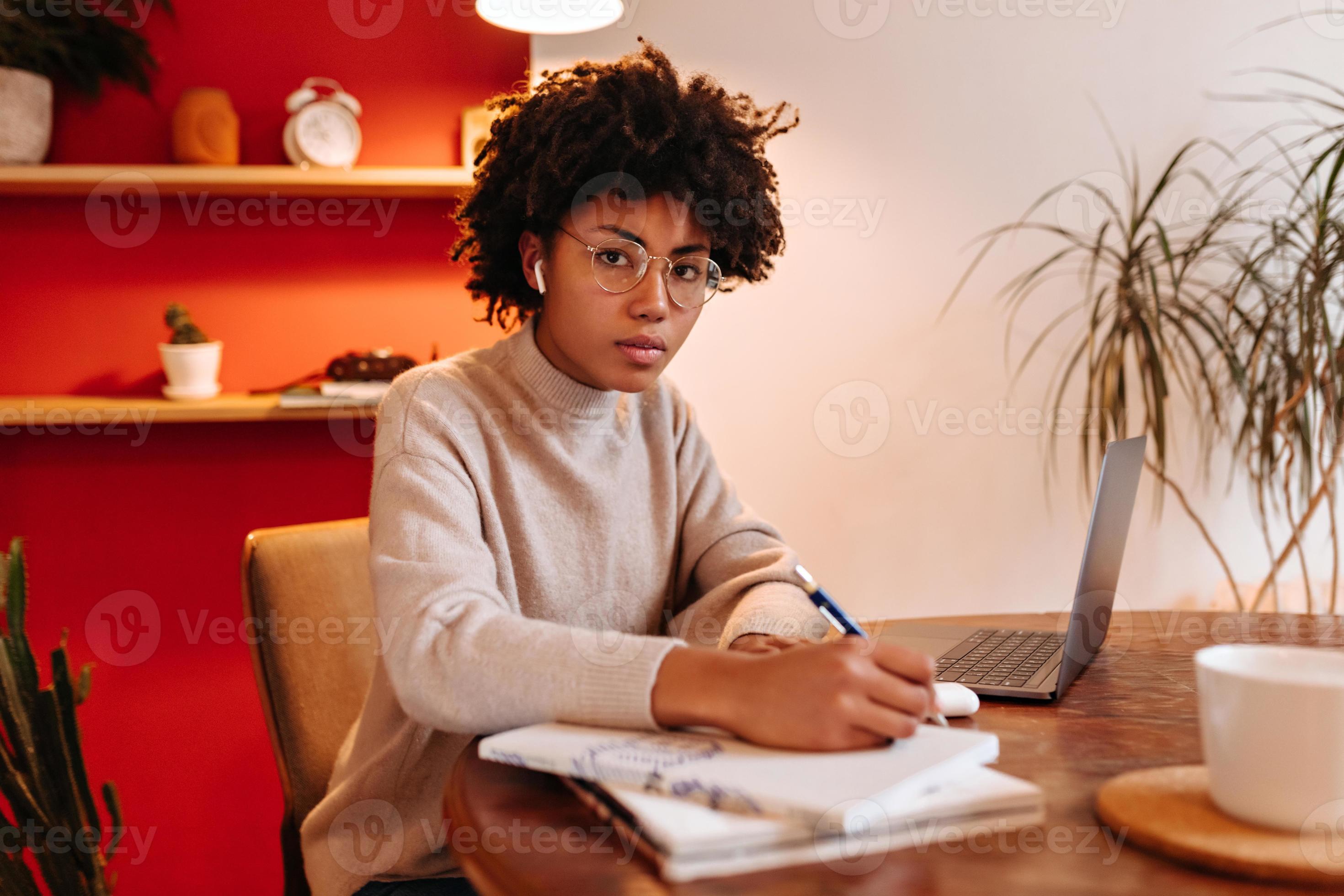 Brown Eyed Woman In Cashmere Sweater Looks Into Camera Learns And