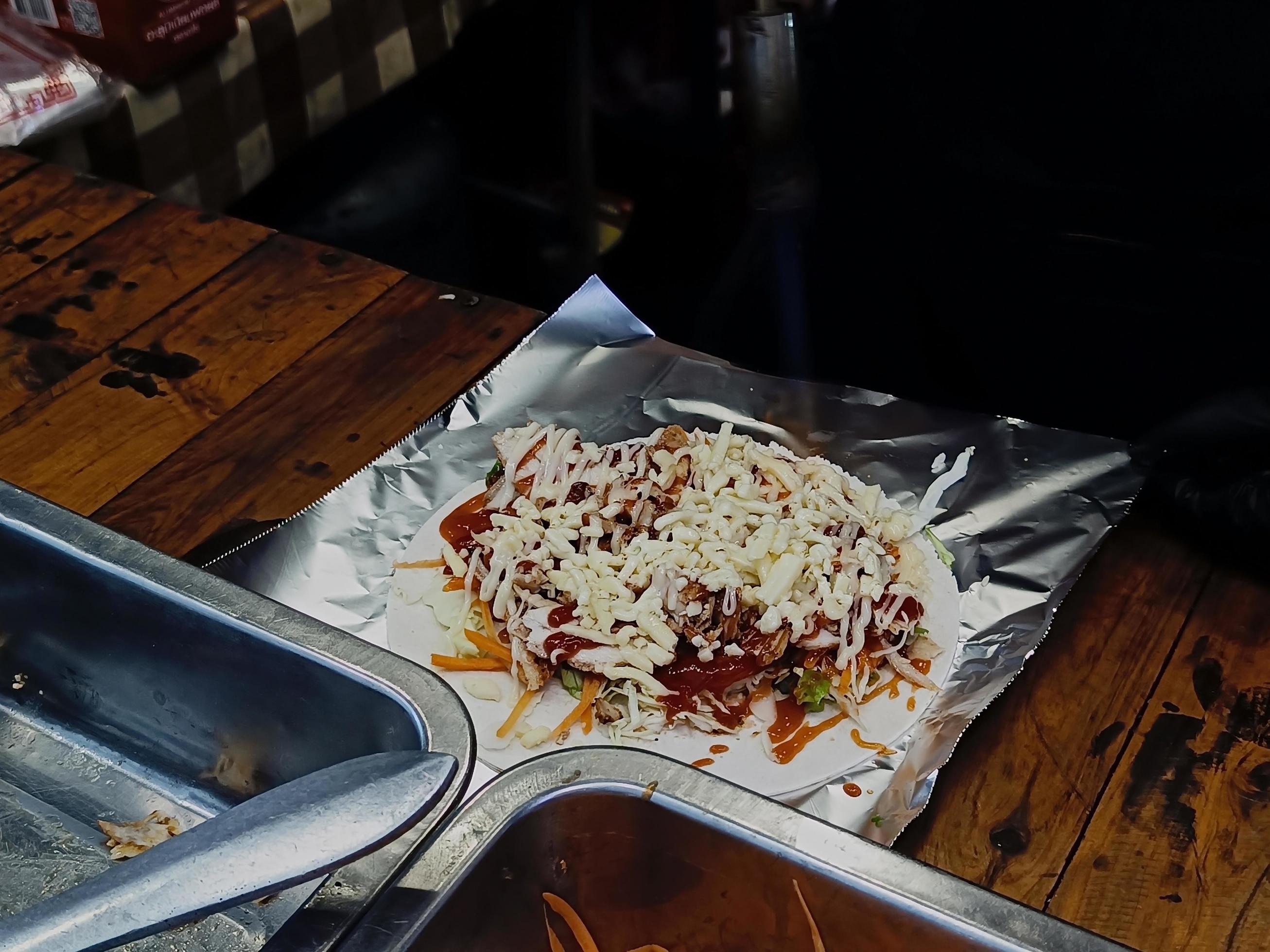 Delicious doner kebab with spicy meat, mozzarella cheese, lettuce ...