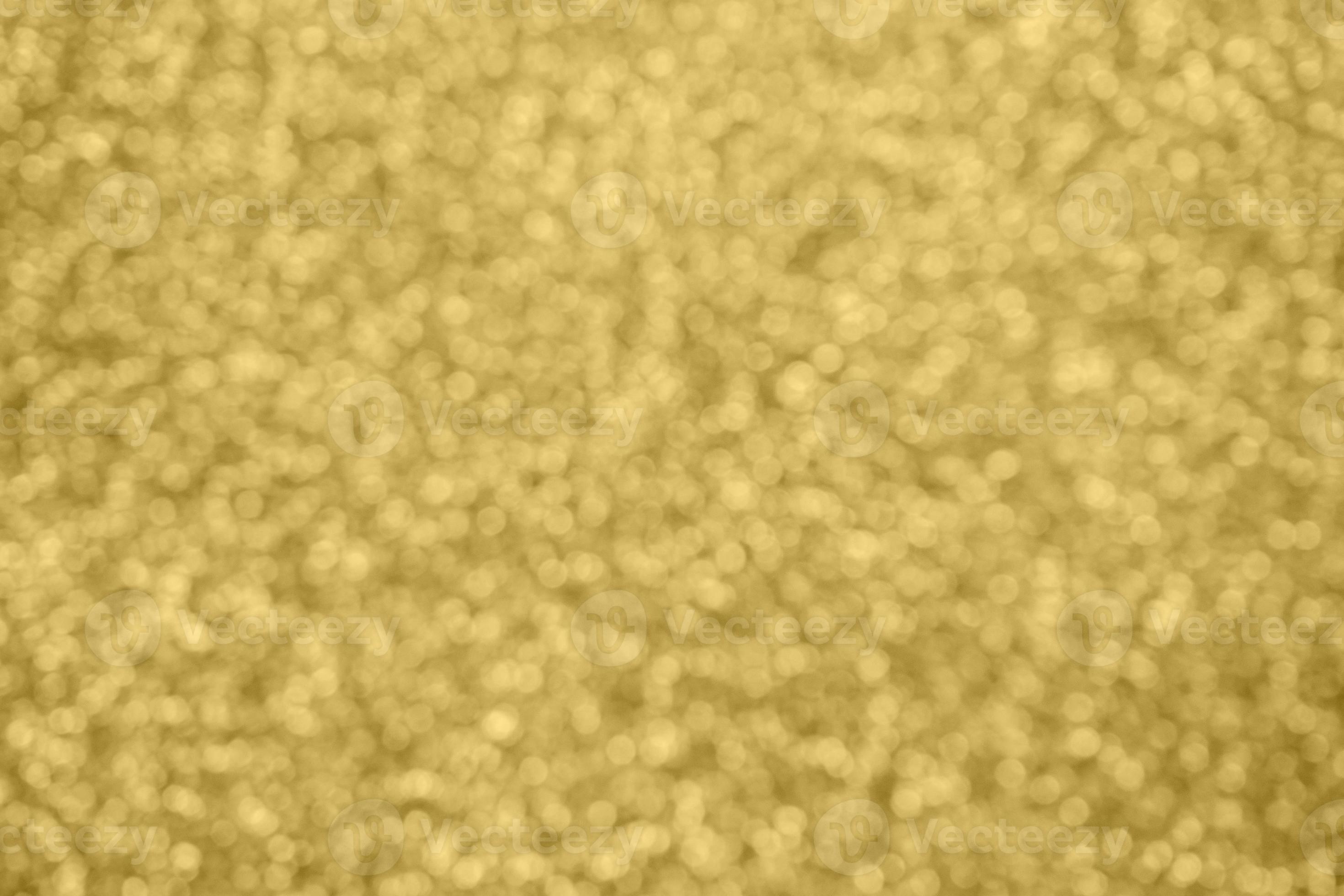 Abstract blur gold glitter sparkle defocused bokeh light background 12969004 Stock Photo at Vecteezy