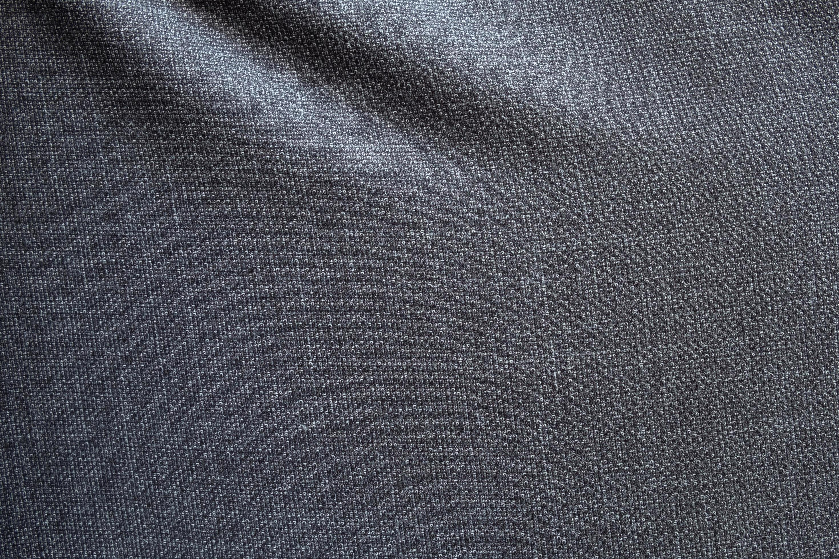 High Resolution With Details And Quality Shot Of Formal Black Or Dark Grey Wool Suit Fabric