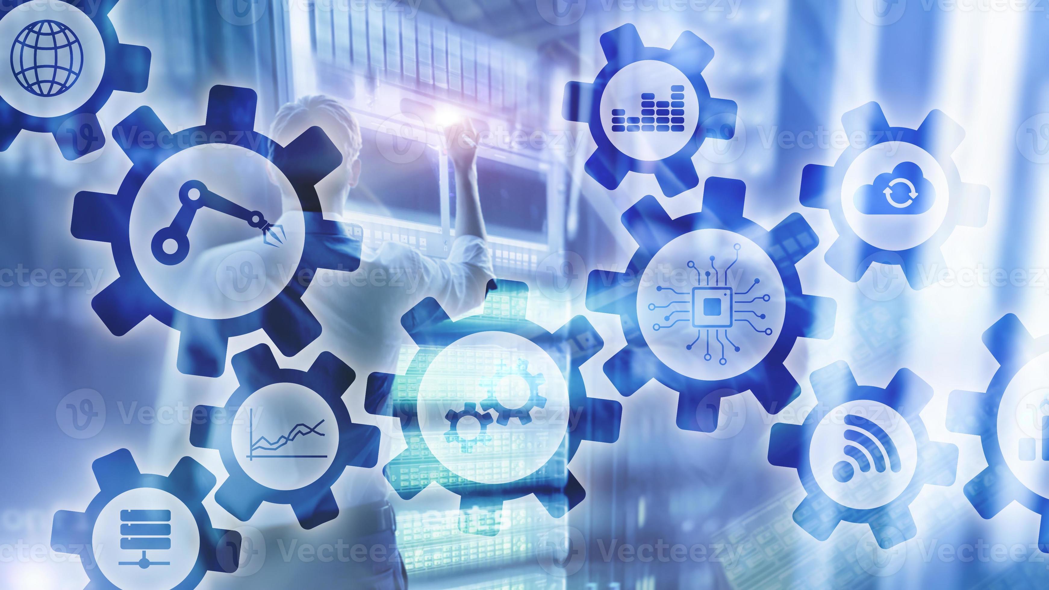 Automation technology and smart industry concept on blurred abstract background. Gears and icons ...
