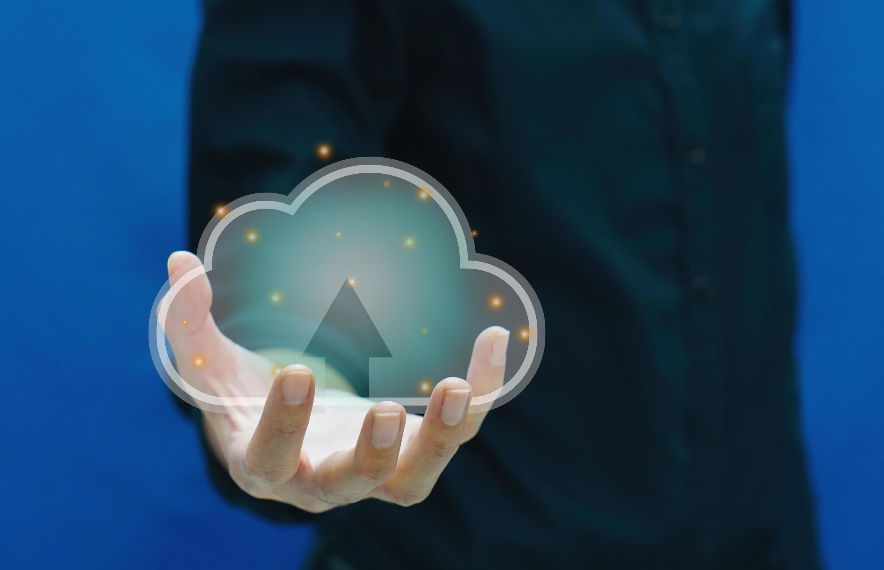 Person's hand holding a virtual technology of data upload icon. Storage ... Person's hand holding a virtual technology of data upload icon. Storage ...