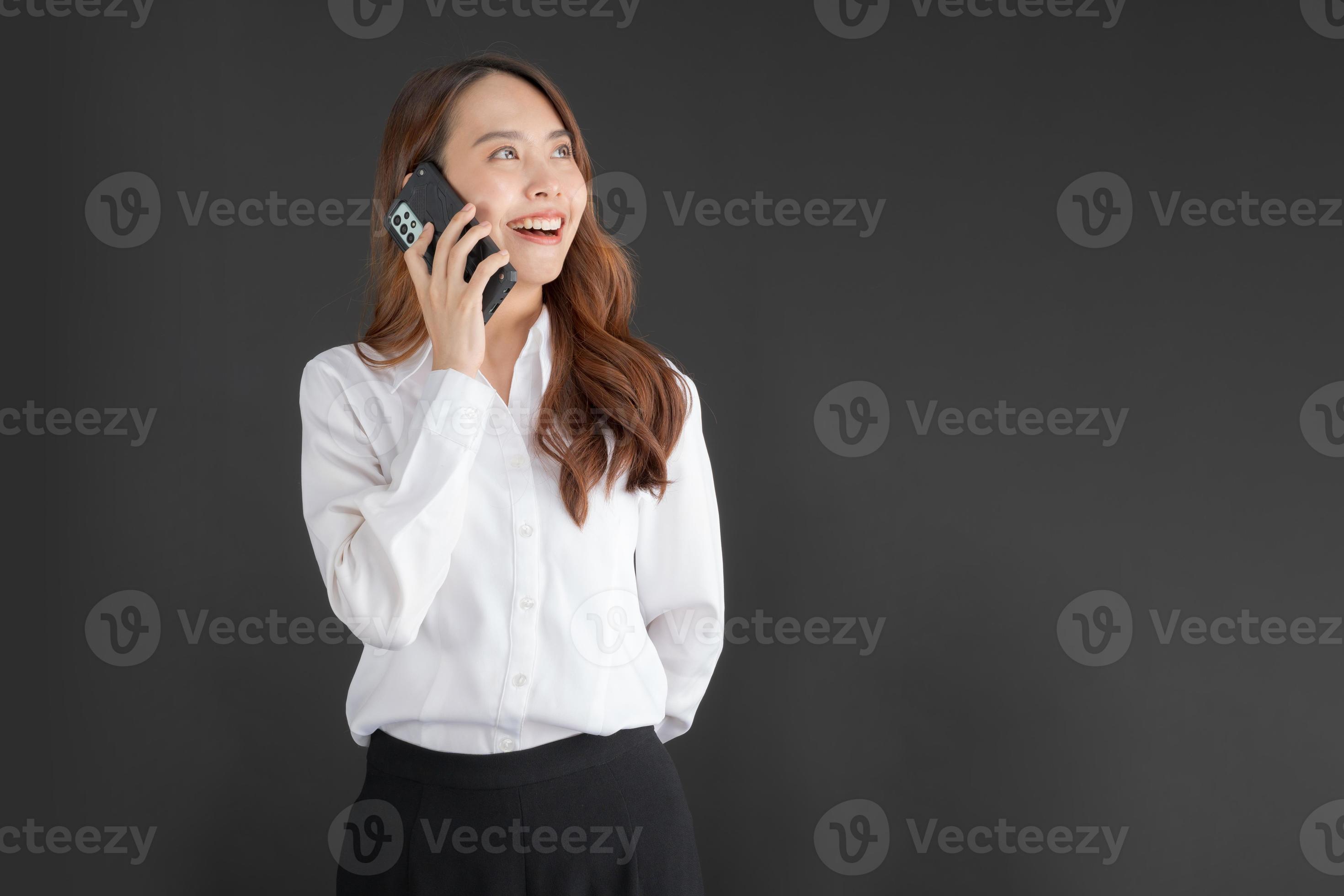 Business woman wearing white shirt talking on the phone. 13099636 Stock ... Business woman wearing white shirt talking on the phone. 13099636 Stock ...