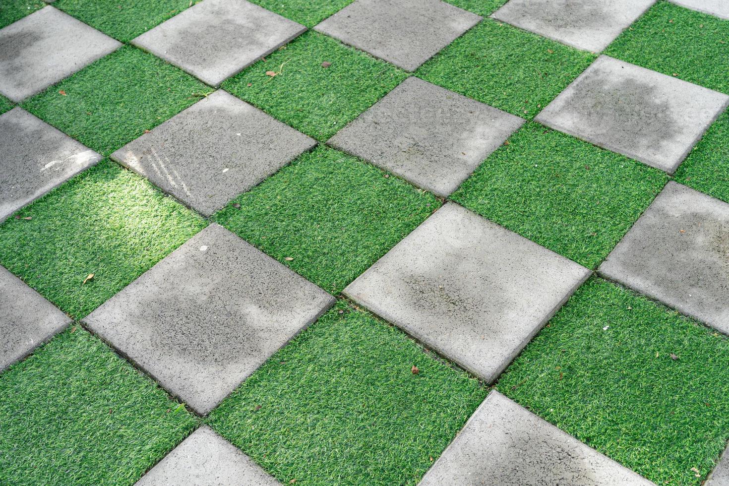 Square Concrete And Grass The Ground And Floor Surfaces In A Garden In The Form Of A Square