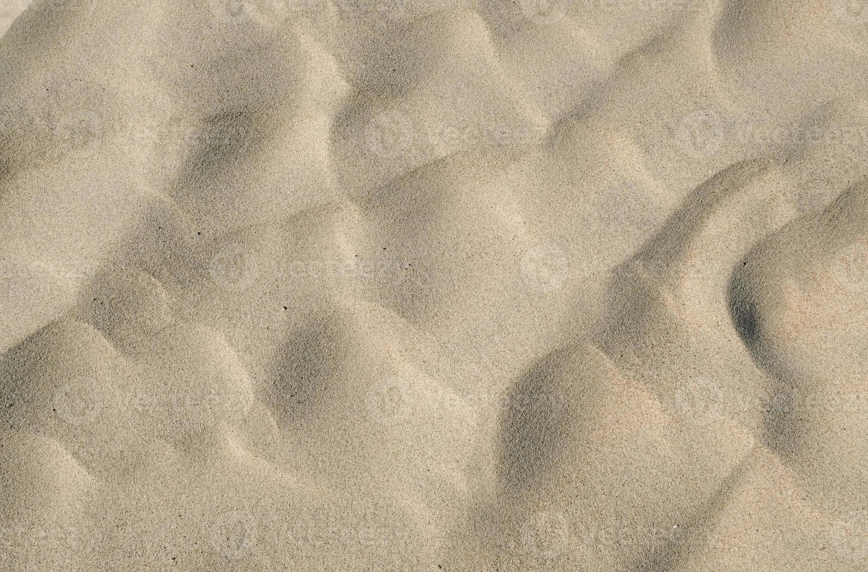 Wavy desert sand texture background. Yellow fine beach sand. Texture background of golden sand ...