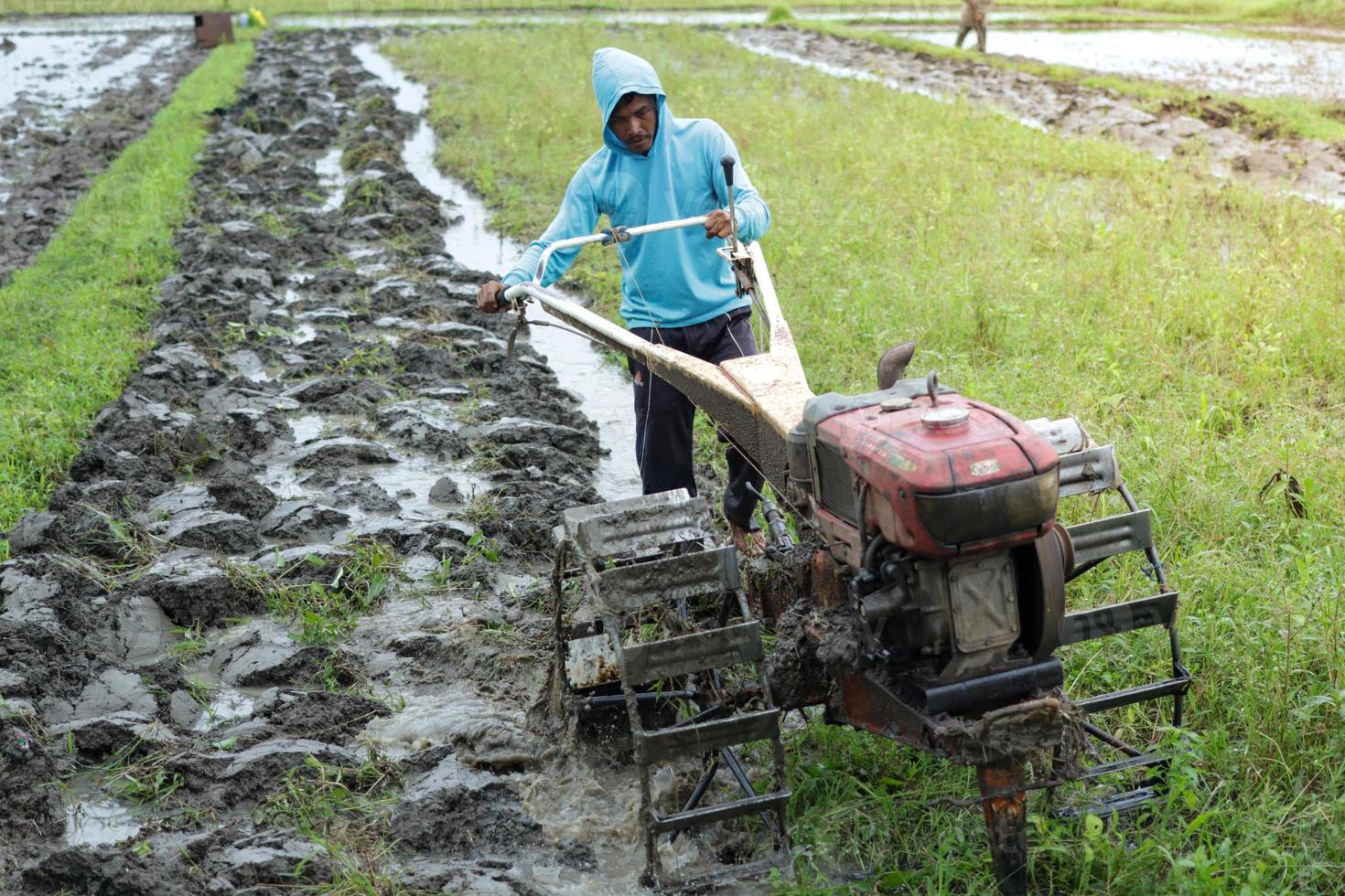 People are plowing fields 13248412 Stock Photo at Vecteezy